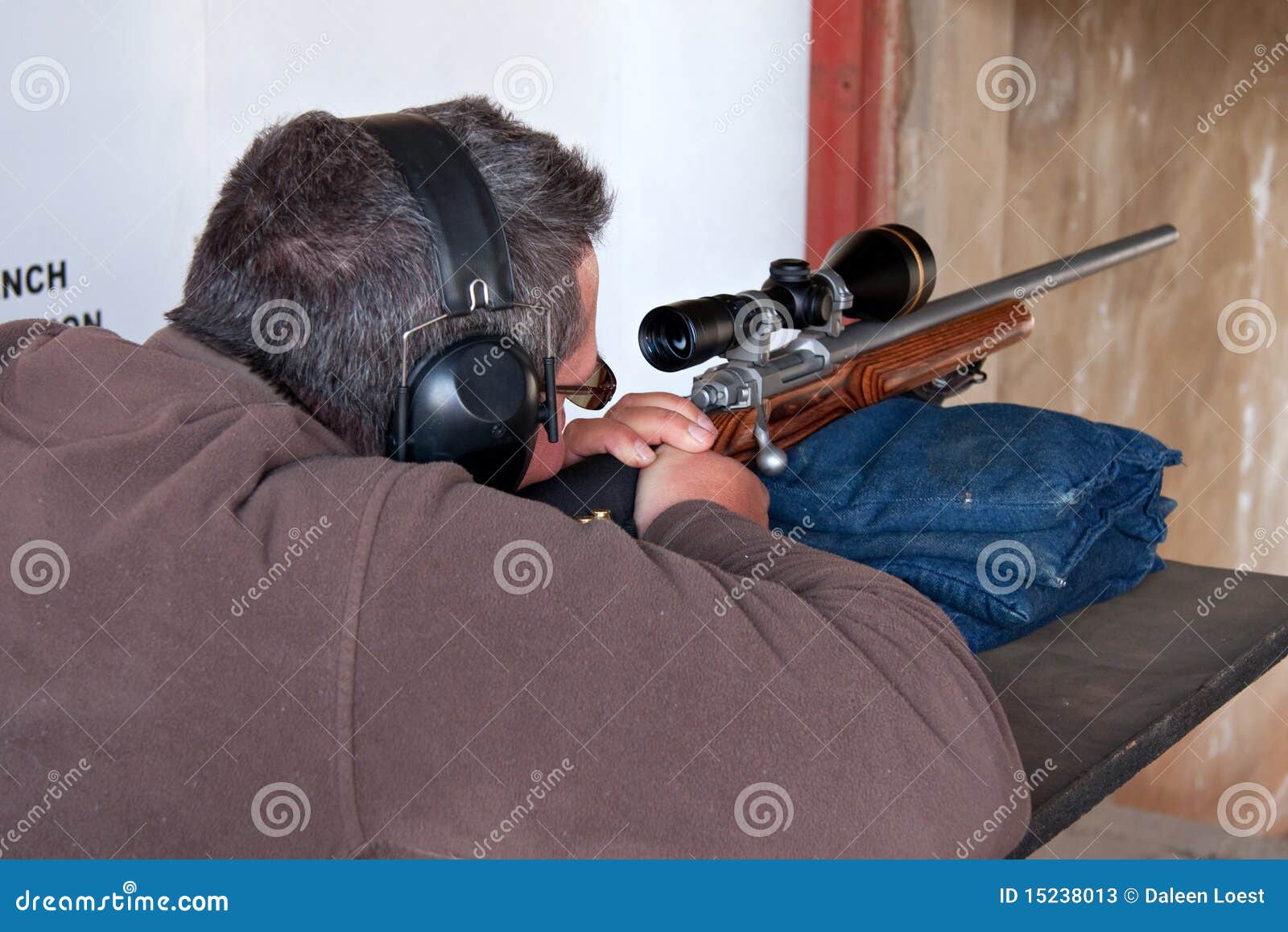 Man rifle shoot stock image. Image of rest, action, rifle - 15238013