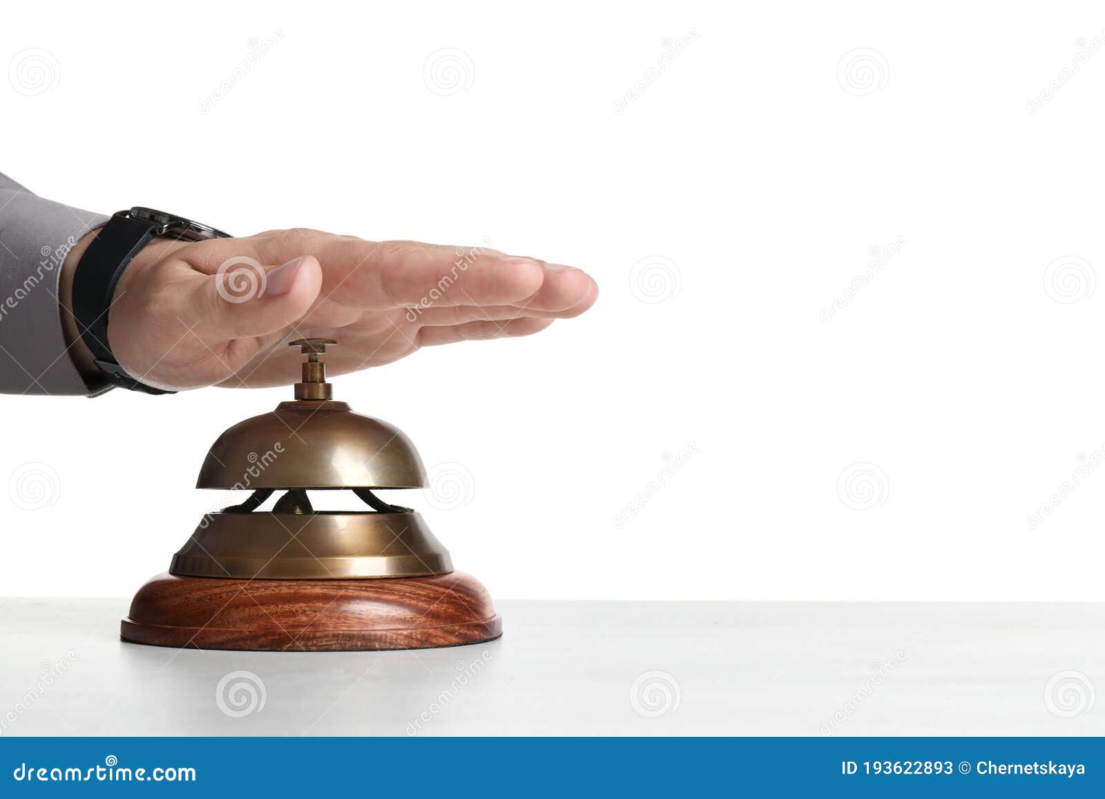Man Ringing Hotel Service Bell at Table Stock Image - Image of ...