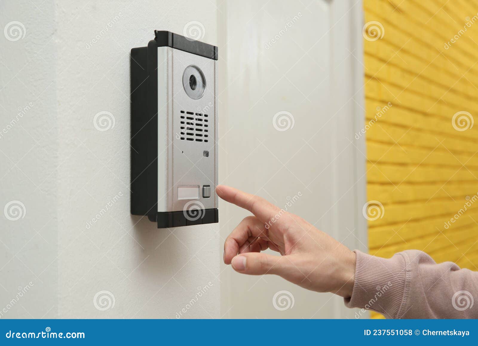Man Ringing Intercom with Camera in Entryway, Closeup Stock Photo ...