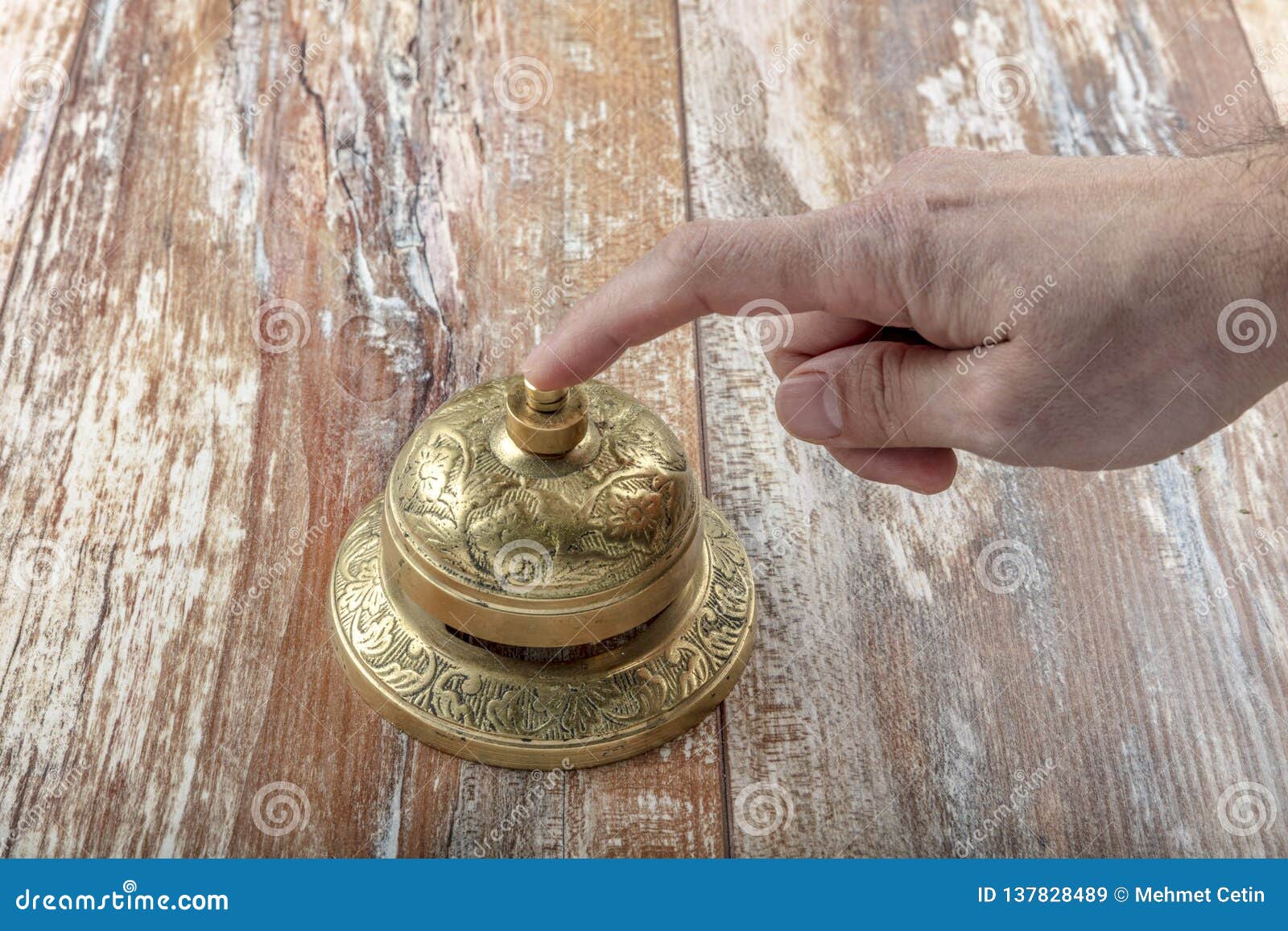 Man Ringing in Service Bell on Reception Table, Closeup Stock Image ...