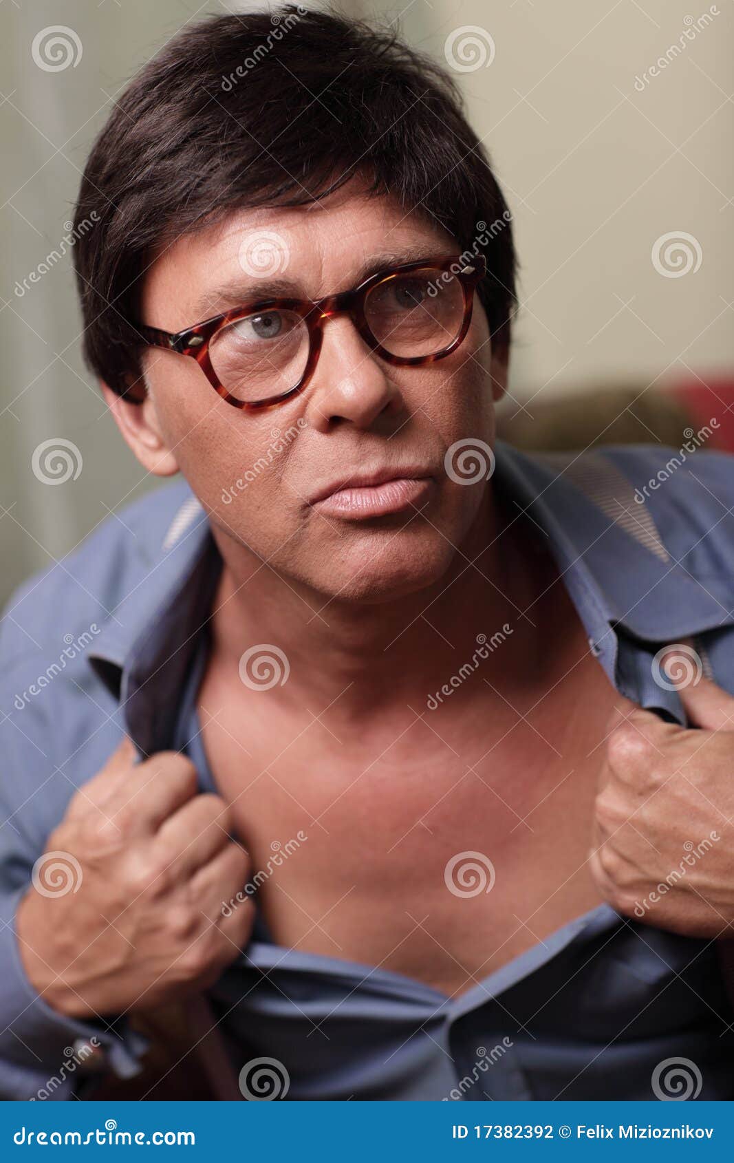 Man ripping his shirt stock photo. Image of exposed, head - 17382392