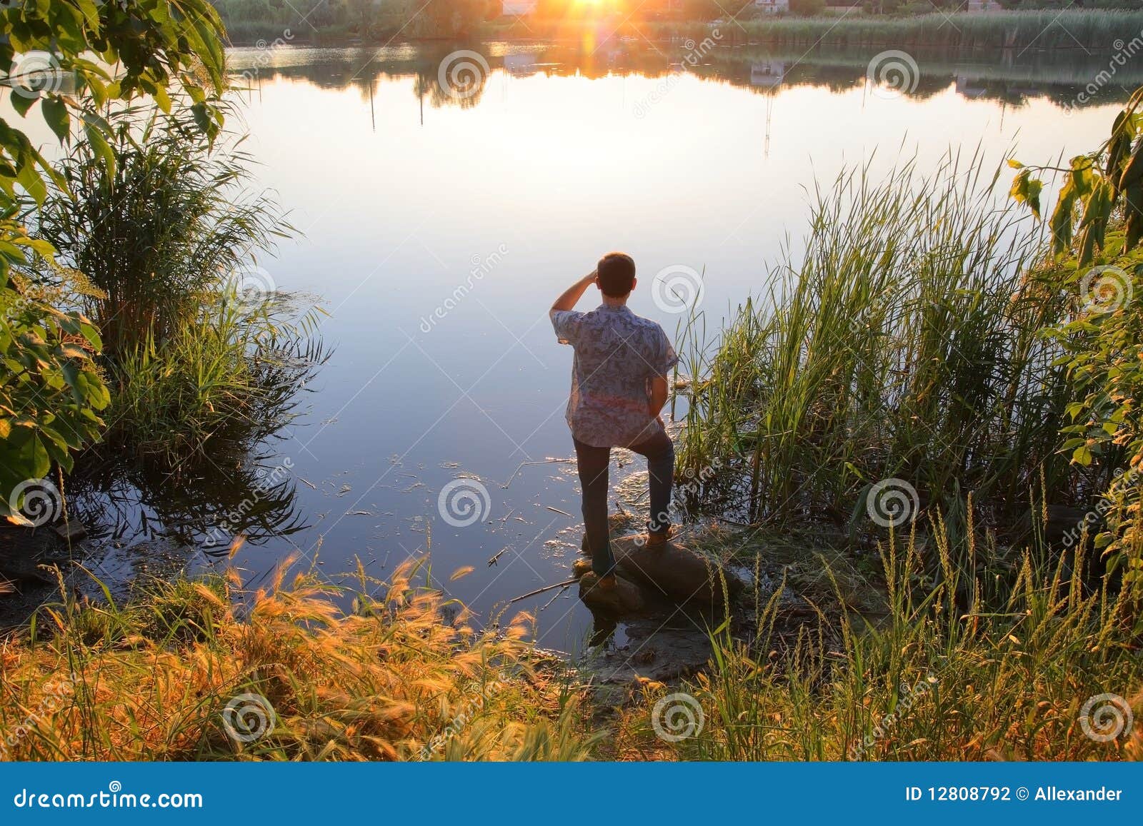 Man by the river stock photo. Image of stones, reed, young - 12808792