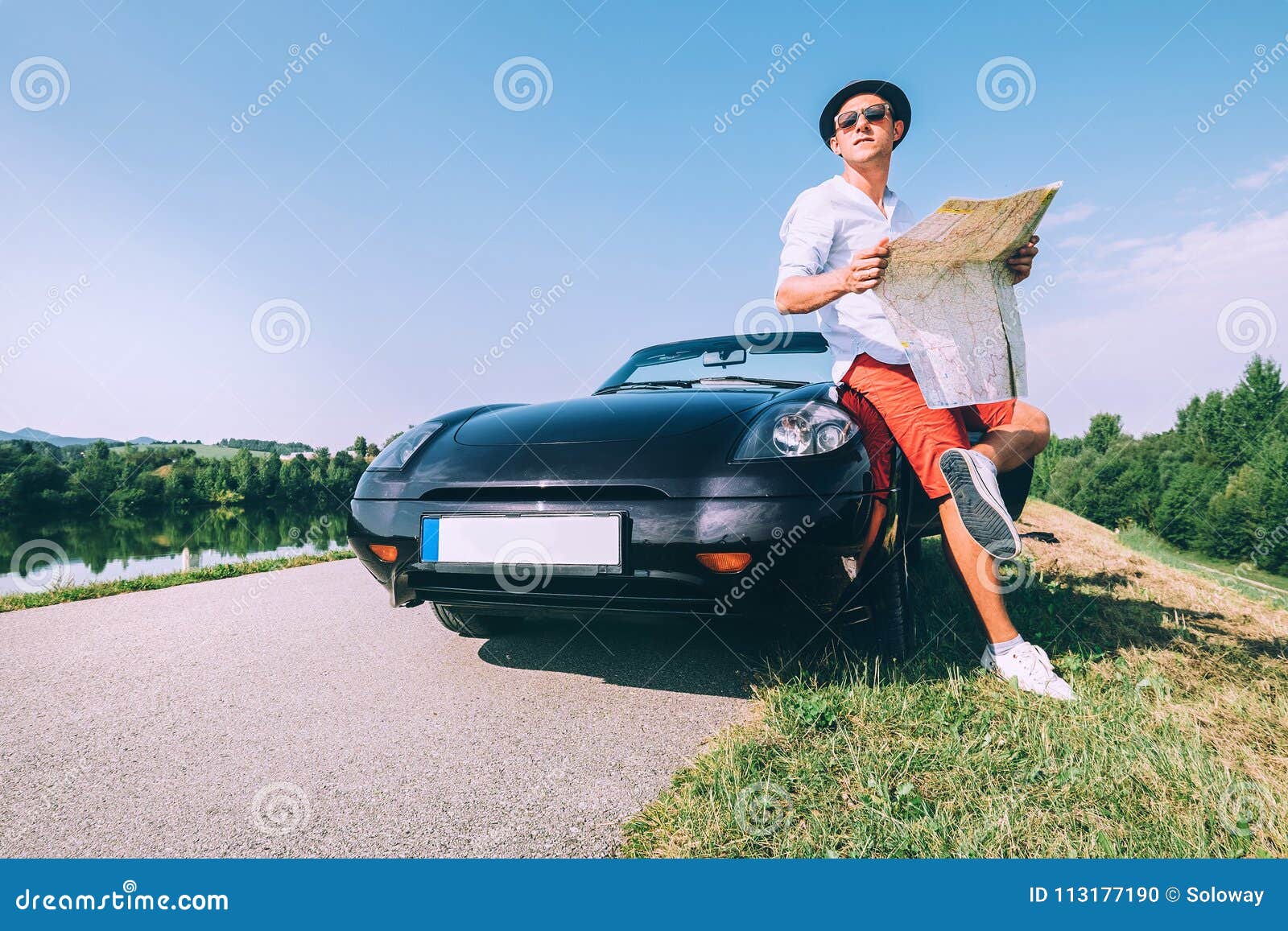 Man with Roads Map Rest on Road an Planning His Travel Stock Photo ...