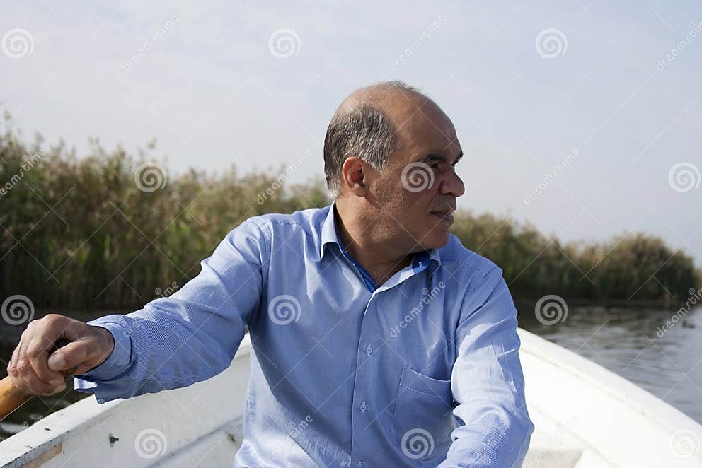 Man roaring stock photo. Image of water, river, cane - 78890626