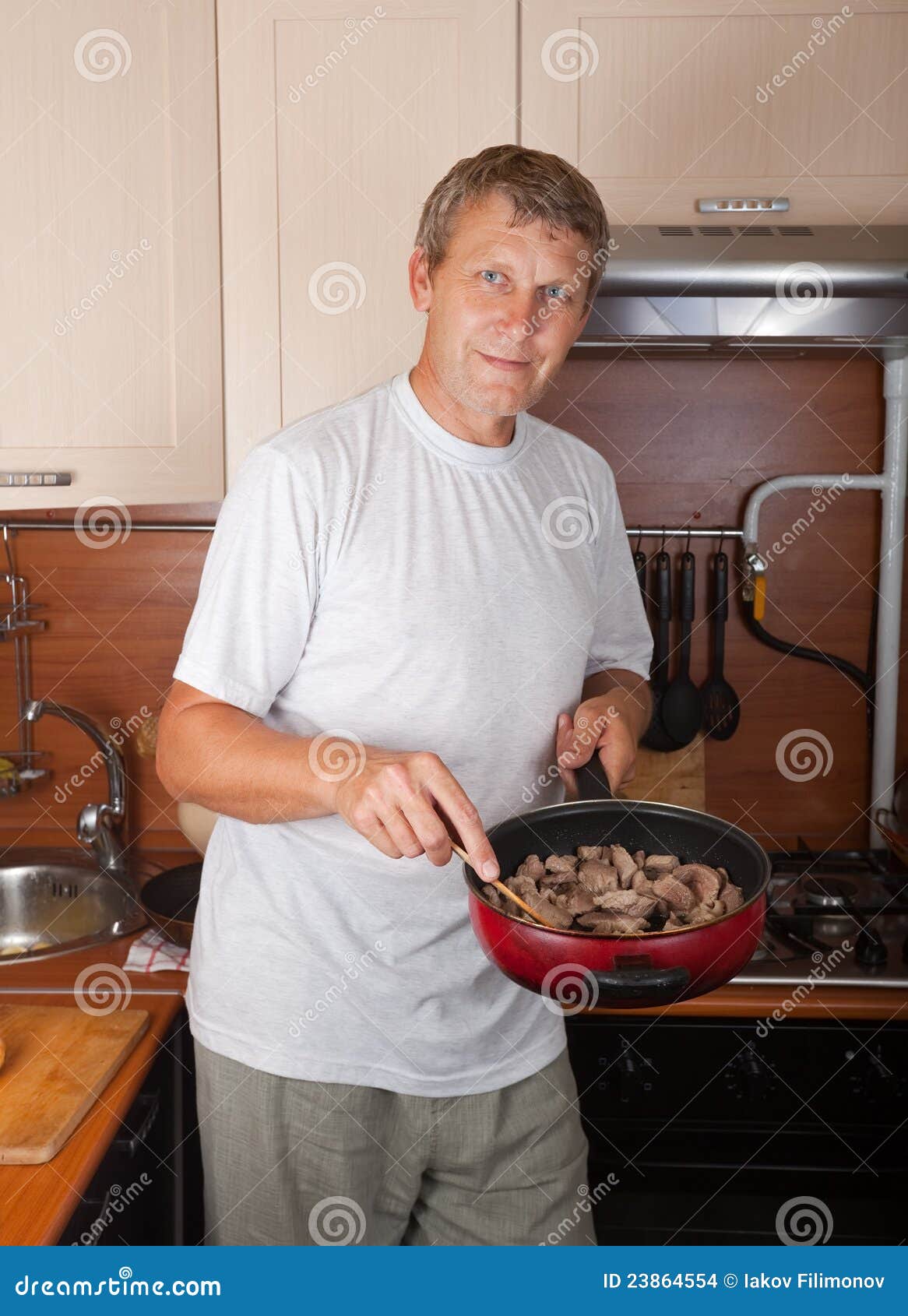 Man roasting meat stock photo. Image of meal, person - 23864554