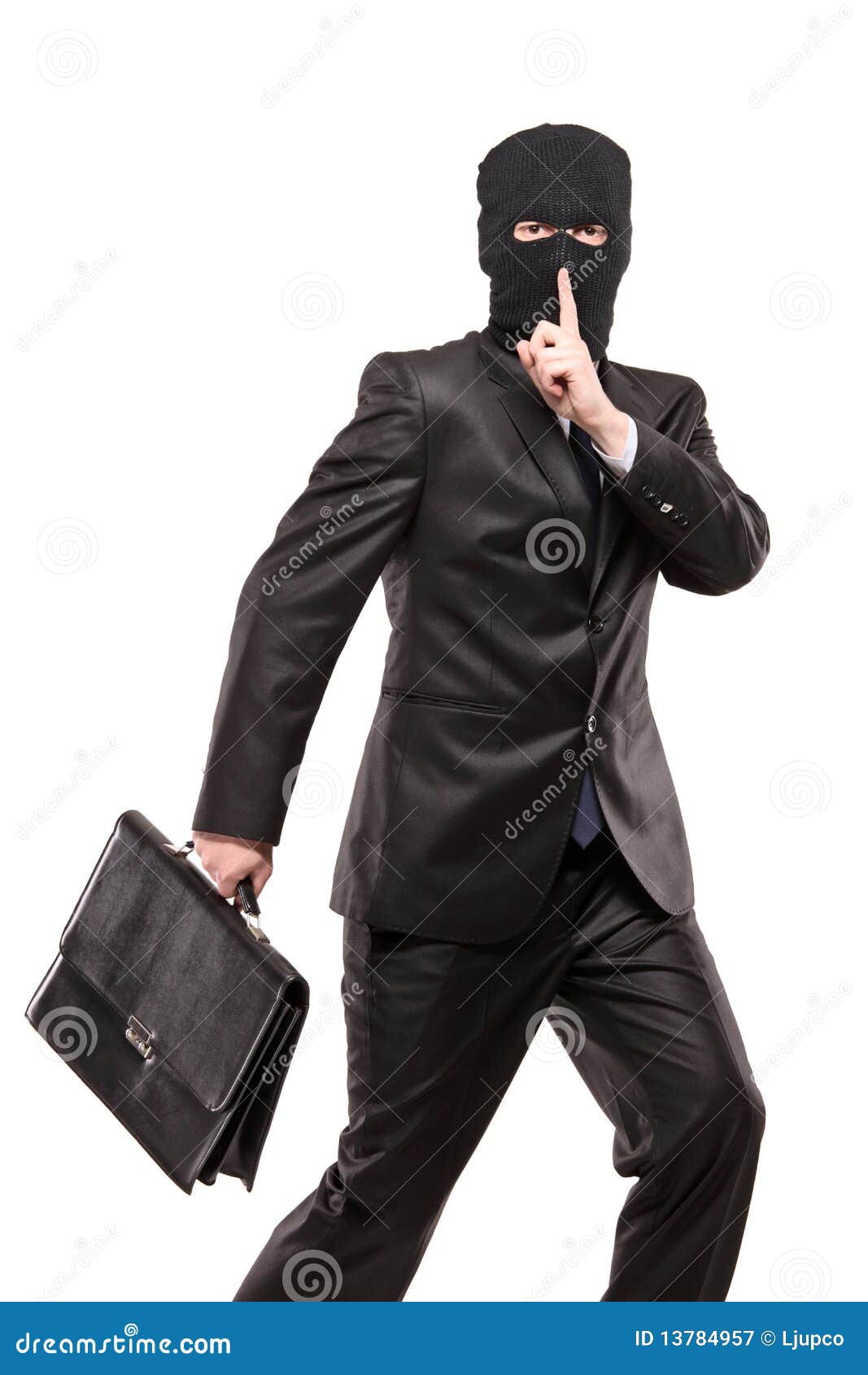 A Man In Robbery Mask Stealing A Briefcase Royalty Free Stock ...