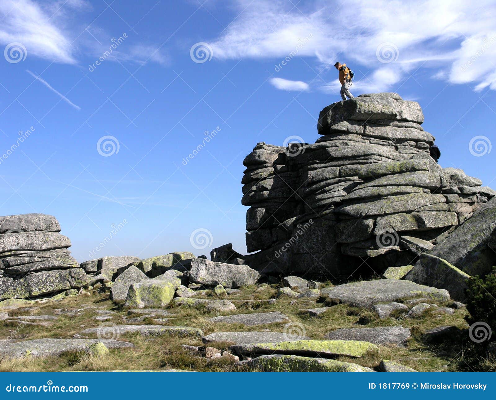 Man on the rock stock image. Image of travel, peak, walk - 1817769