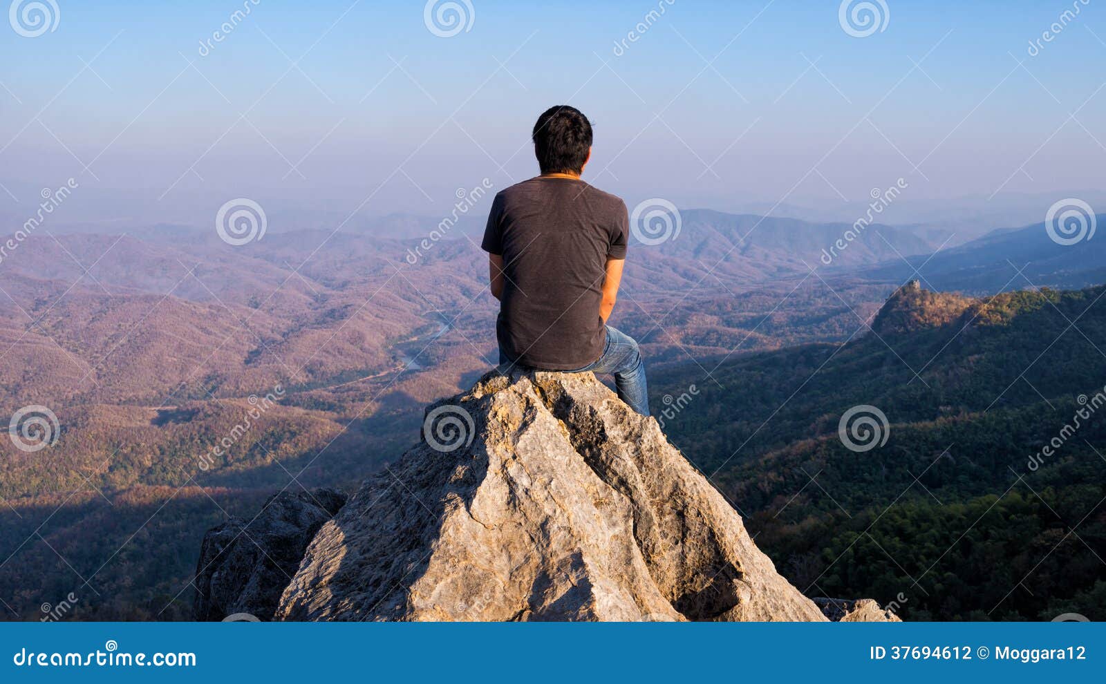 Man on rock at mountain stock photo. Image of high, silhouette - 37694612