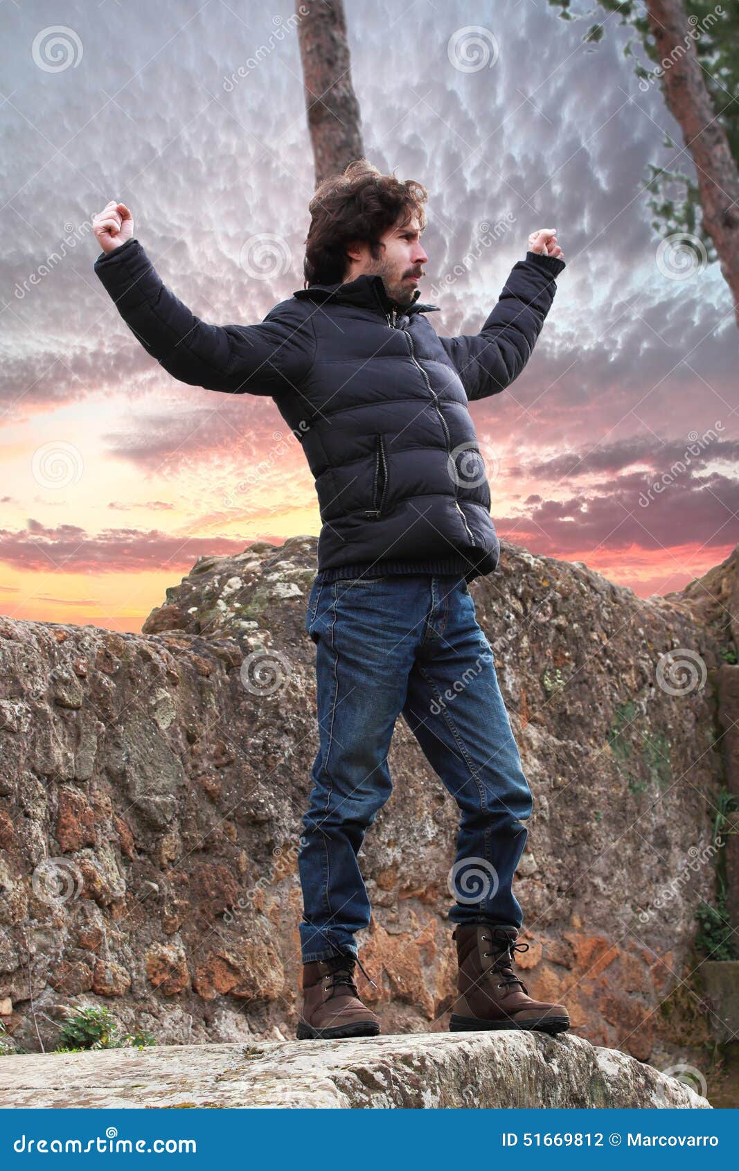 Man on a rock stock photo. Image of stone, freedom, energy - 51669812