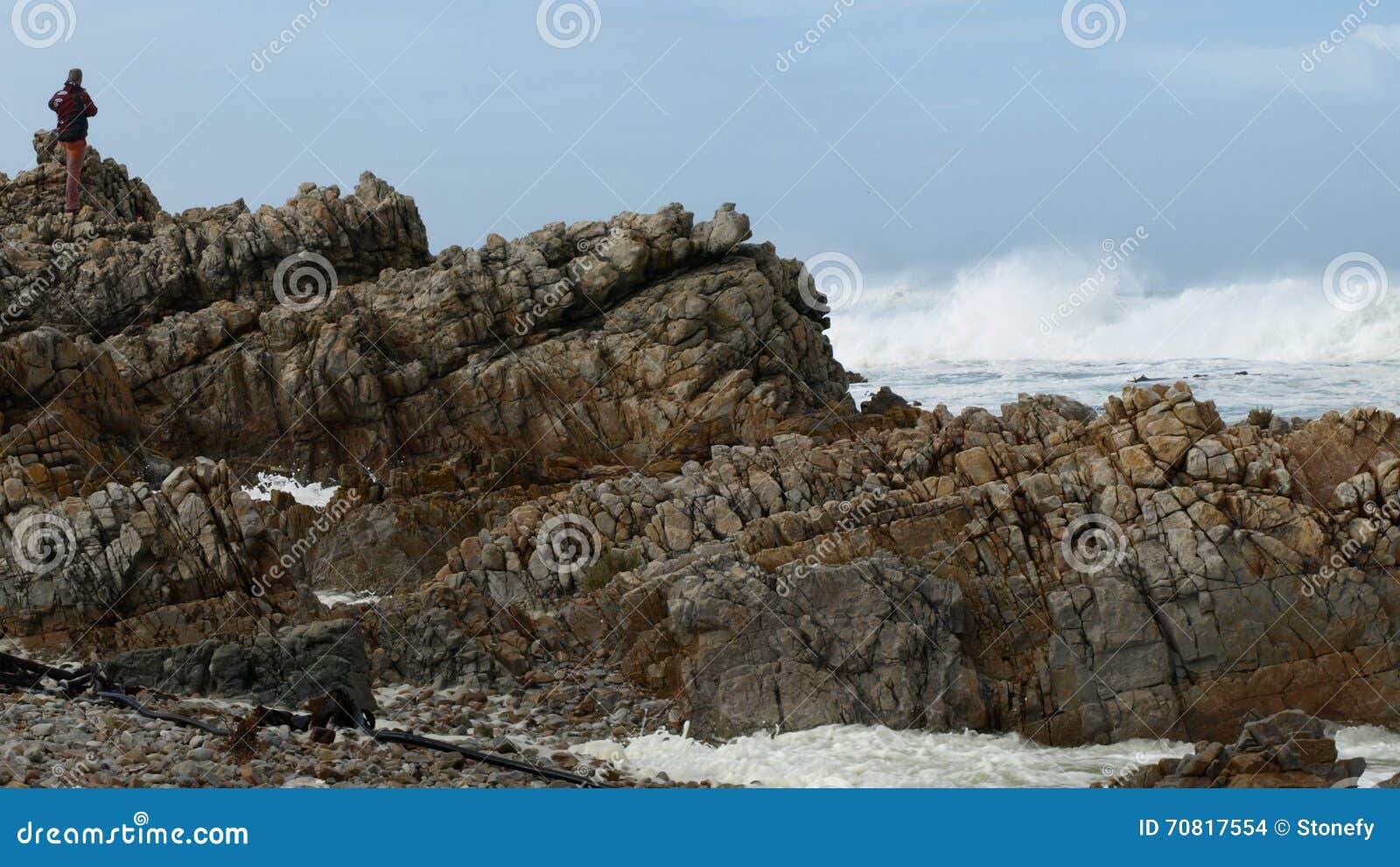Man on rocks stock photo. Image of park, blue, landscape - 70817554