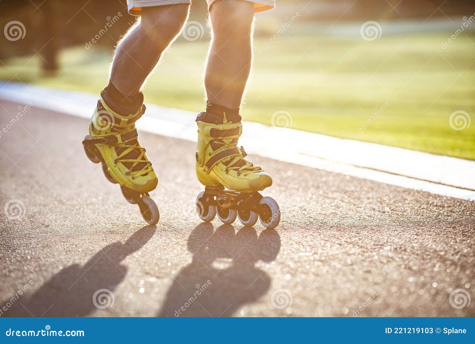 The Man Roll.erblading on the Asphalt. Stock Image - Image of legs ...