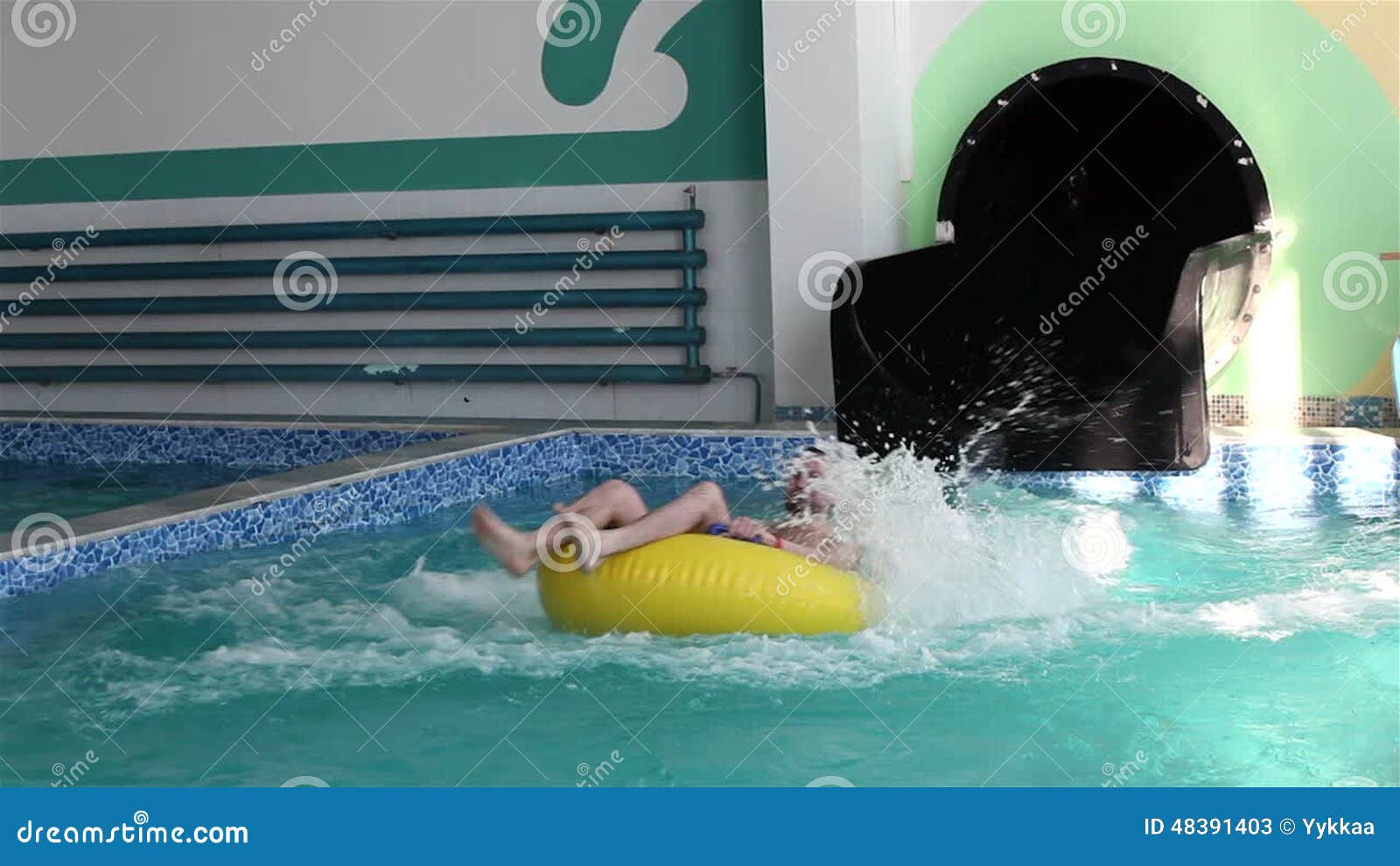 Man Rolled Down a Water Slide on Rubber Rings. Stock Video - Video of ...
