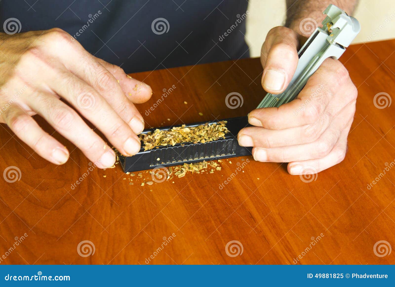Man Rolling Cigarettes Using Fresh Tobacco Stock Image - Image of ...