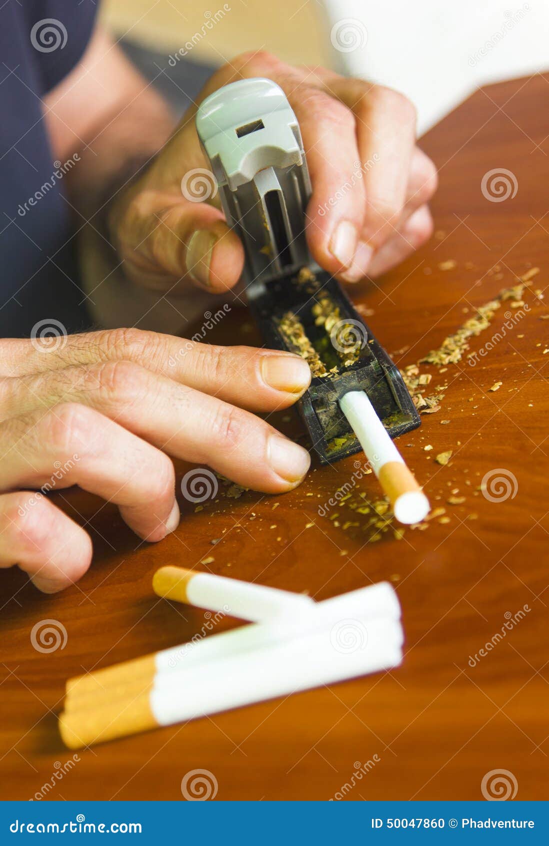 Man Rolling Cigarettes Using Fresh Tobacco Stock Photo - Image of ...