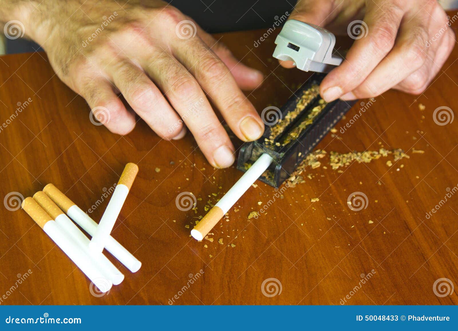 Man Rolling Cigarettes Using Fresh Tobacco Stock Image - Image of ...