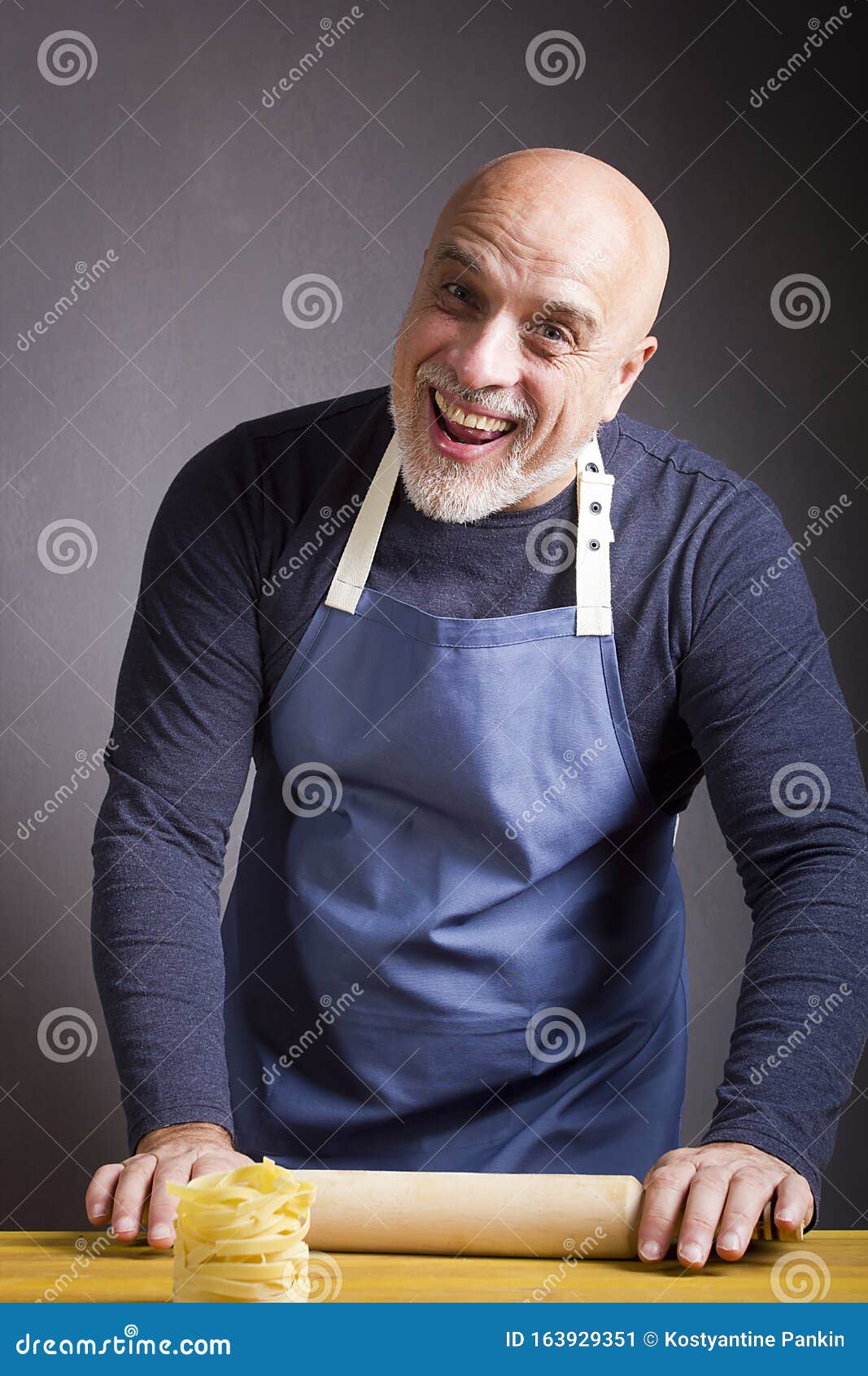 Man with rolling pin stock image. Image of dough, healthy - 163929351