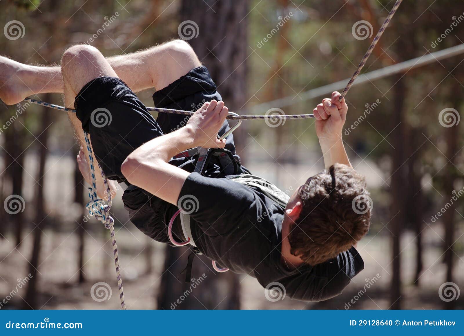 Man on rope course stock photo. Image of level, hangs - 29128640