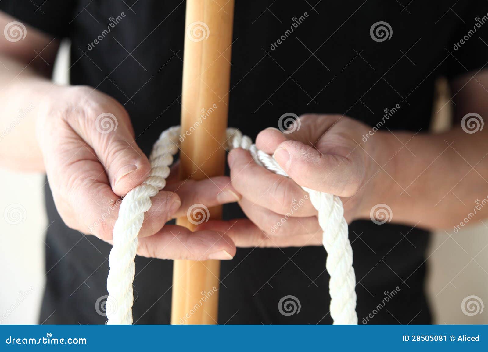 Man with Rope and Wood Pole Stock Image - Image of demonstrating ...
