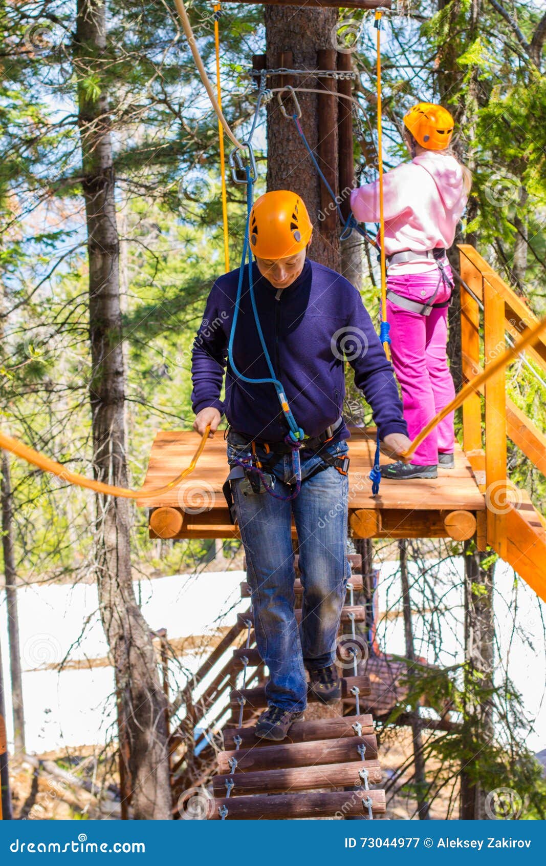 A man in a ropes course stock image. Image of safety - 73044977