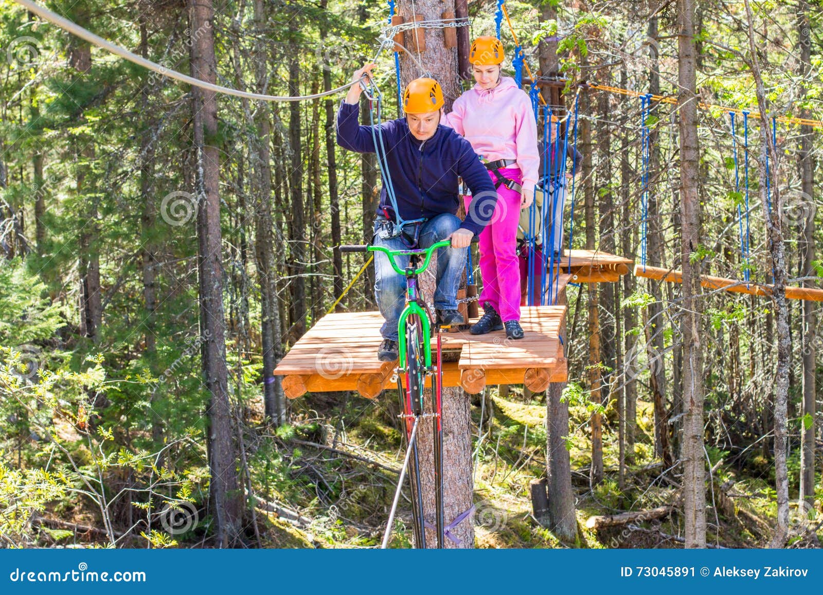 A man in a ropes course stock image. Image of moving - 73045891