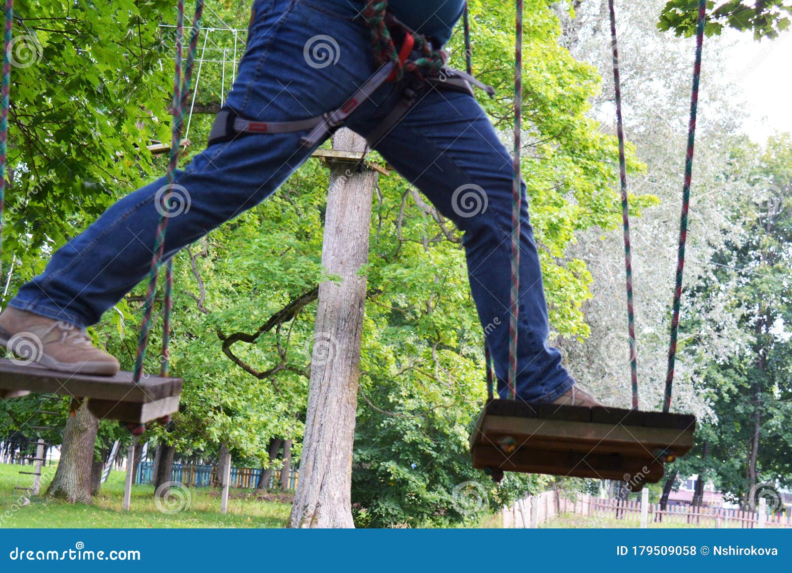 Man on the Ropes Course, Stepping Off the Board Stock Photo - Image of ...