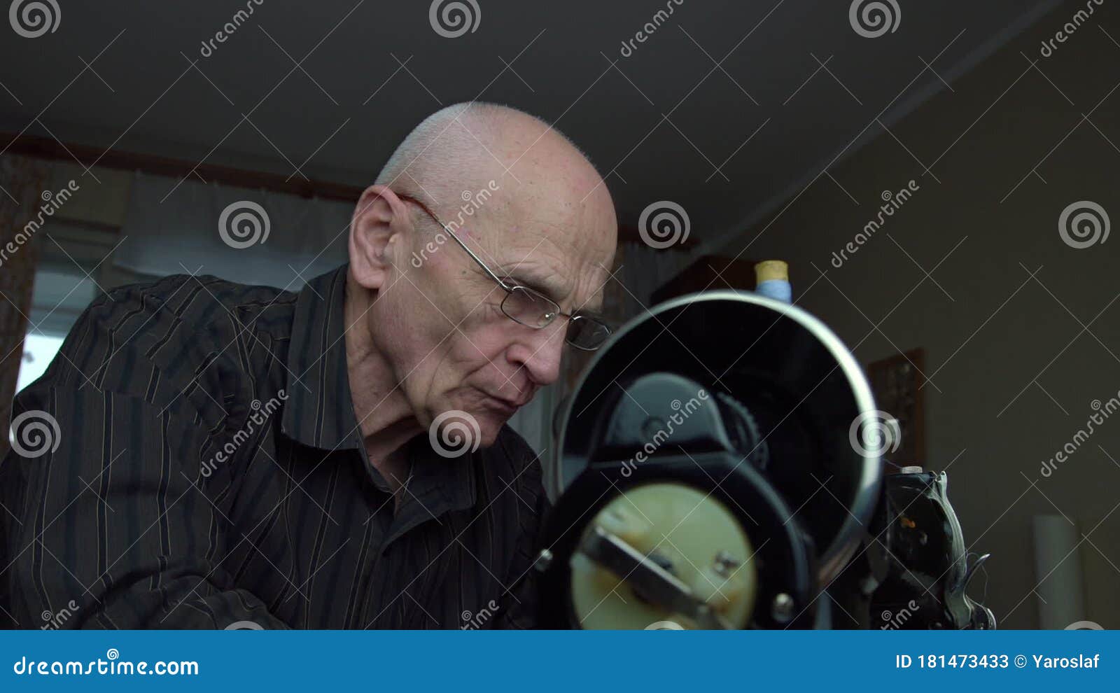 Man Rotates Flywheel Bringing Machine To Work with Thread Stock Video ...