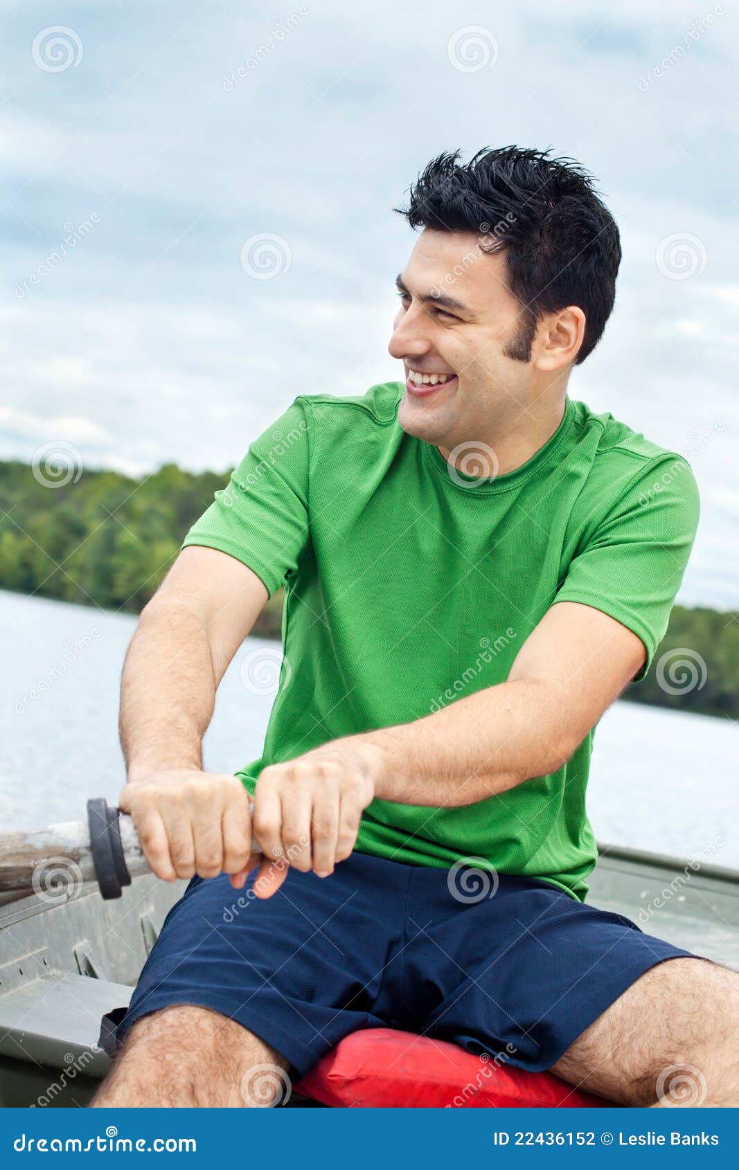 Man Rowing a Boat on a Lake Stock Photo - Image of water, outdoors ...