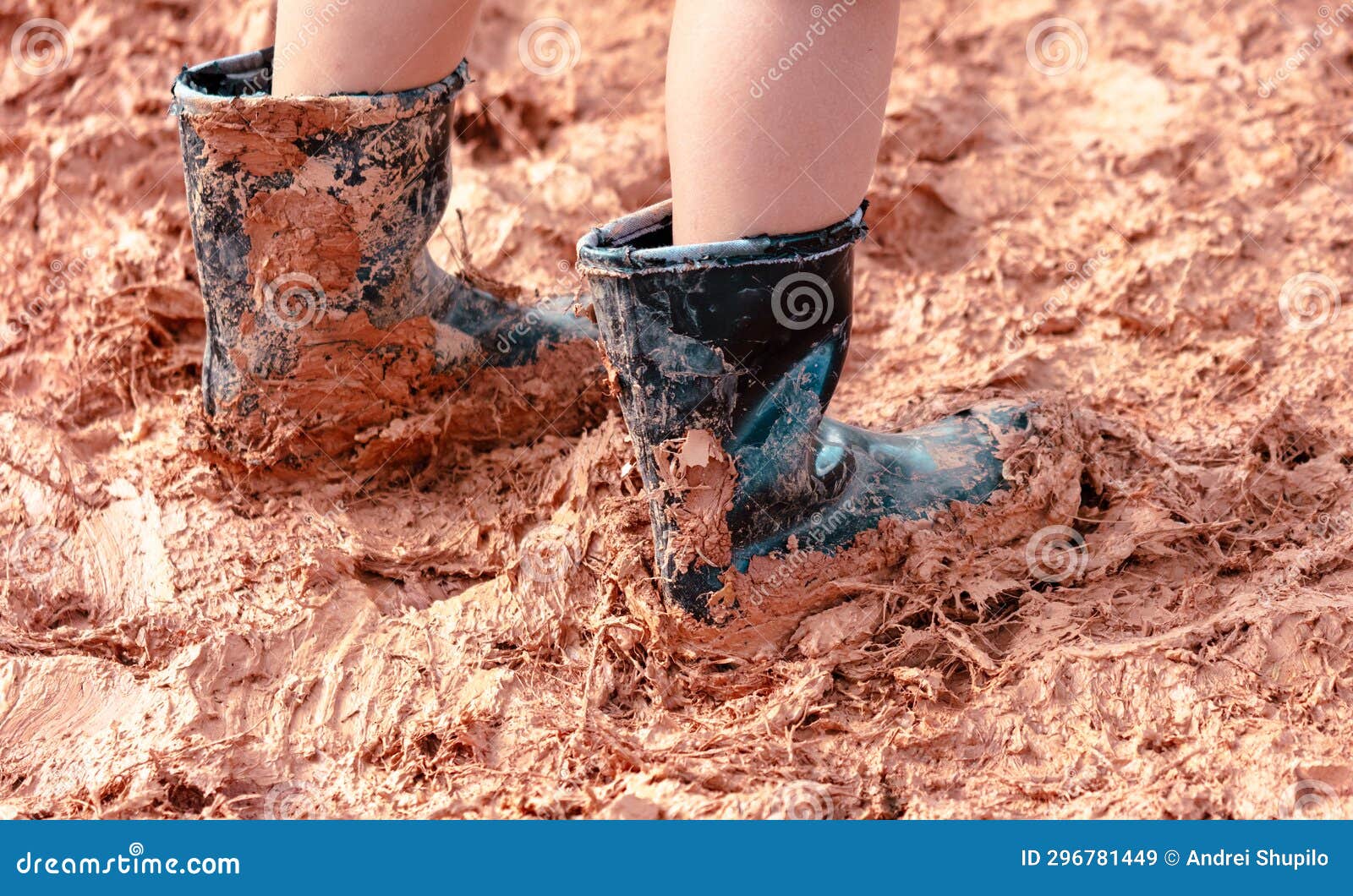 A Man in Rubber Boots Walks on Clay Stock Image - Image of rain, road ...