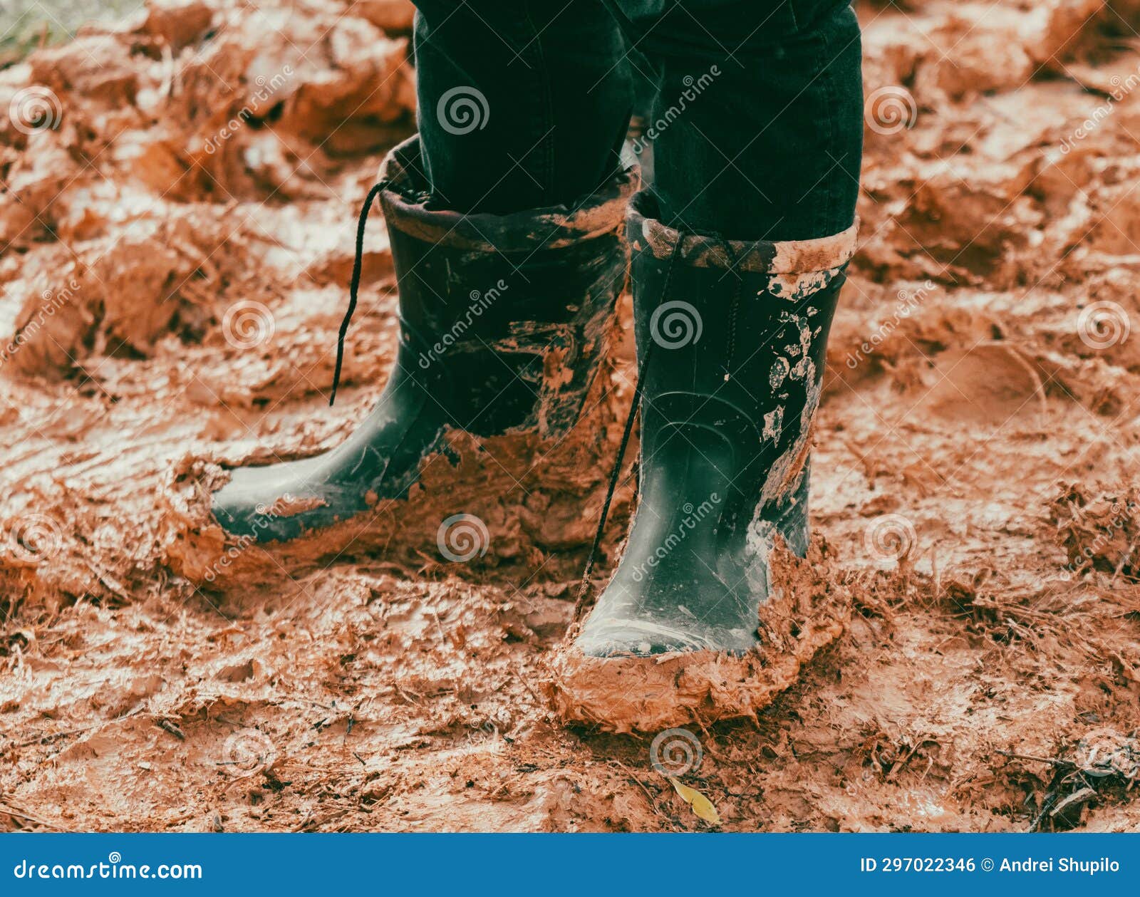A Man in Rubber Boots Walks on Clay Stock Photo - Image of adventure ...
