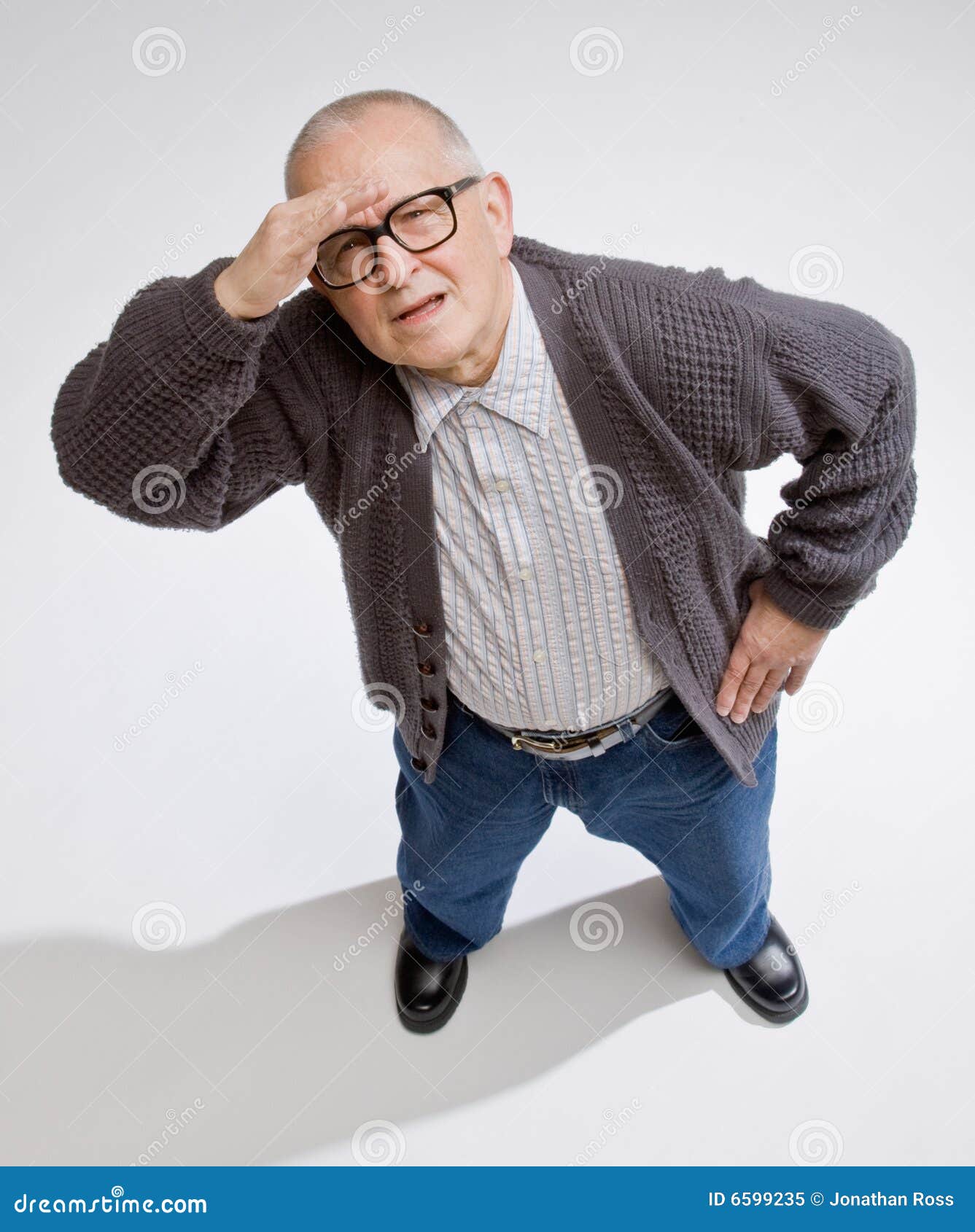 Man Rubbing Forehead Thinking Stock Image - Image of looking, rubbing ...