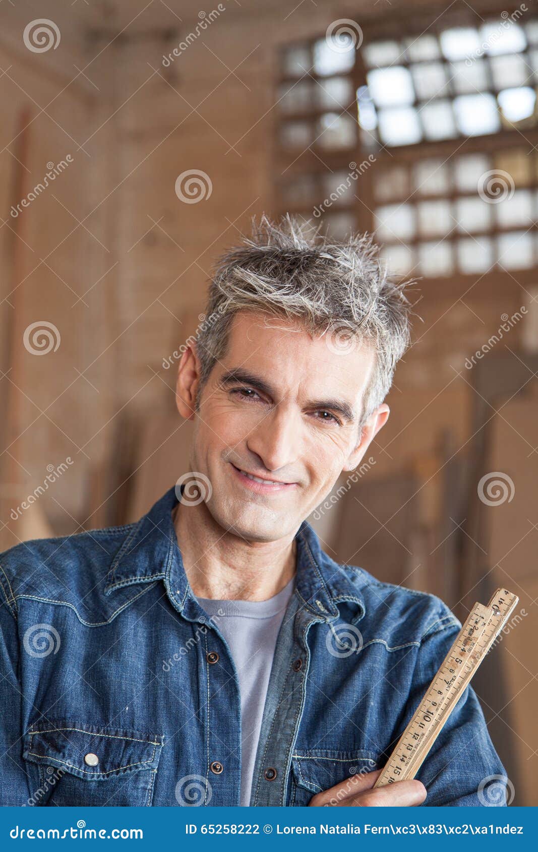 Man with a ruler stock photo. Image of people, smile - 65258222