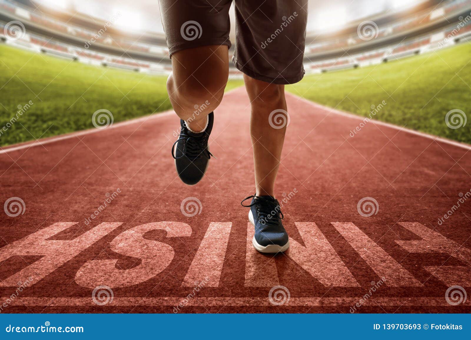 Man running on the track stock image. Image of games - 139703693