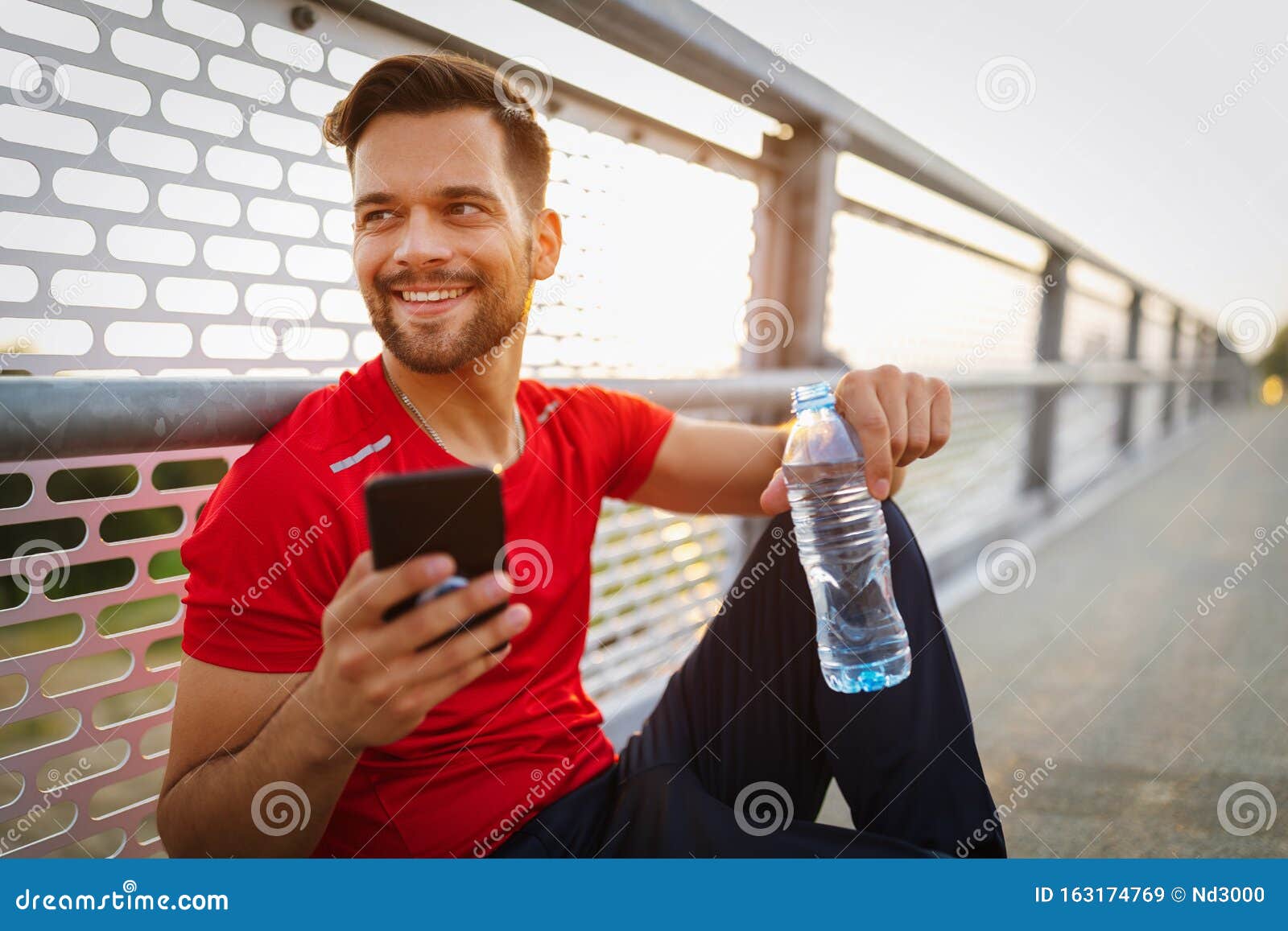 Man Runner Taking a Break during Training Outdoors. Jogger Resting ...