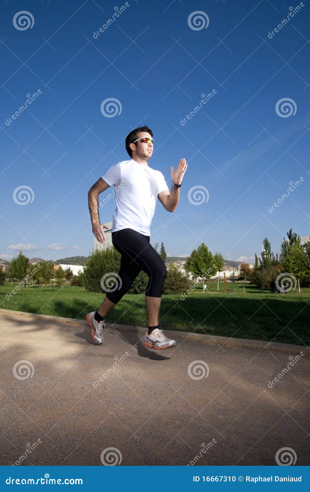 Man running stock photo. Image of green, white, male - 16667310