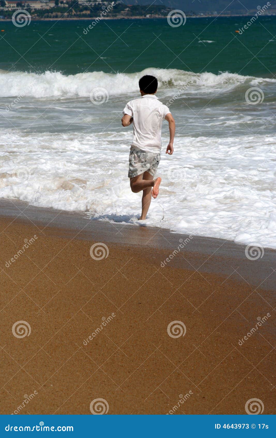 A Man Running Along Beach with Ocean Waves Stock Image - Image of alone ...