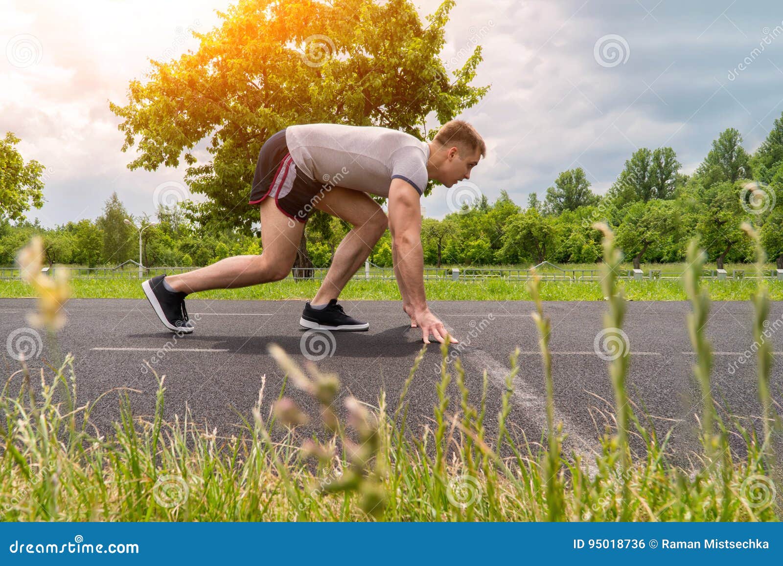 The Man is Running Around the Stadium. Training Outdoors Stock Photo ...