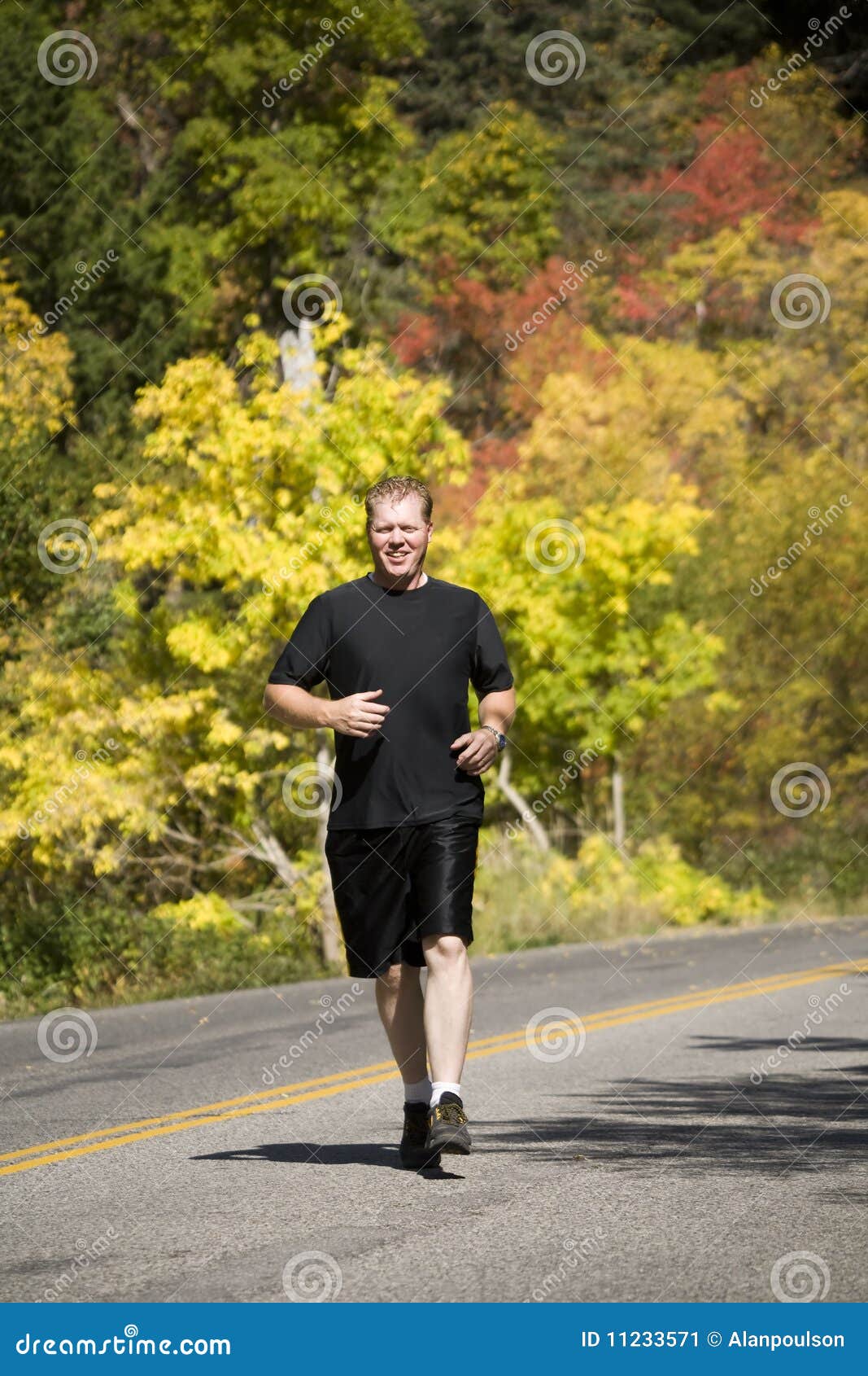 Man running in black stock image. Image of fitness, health - 11233571