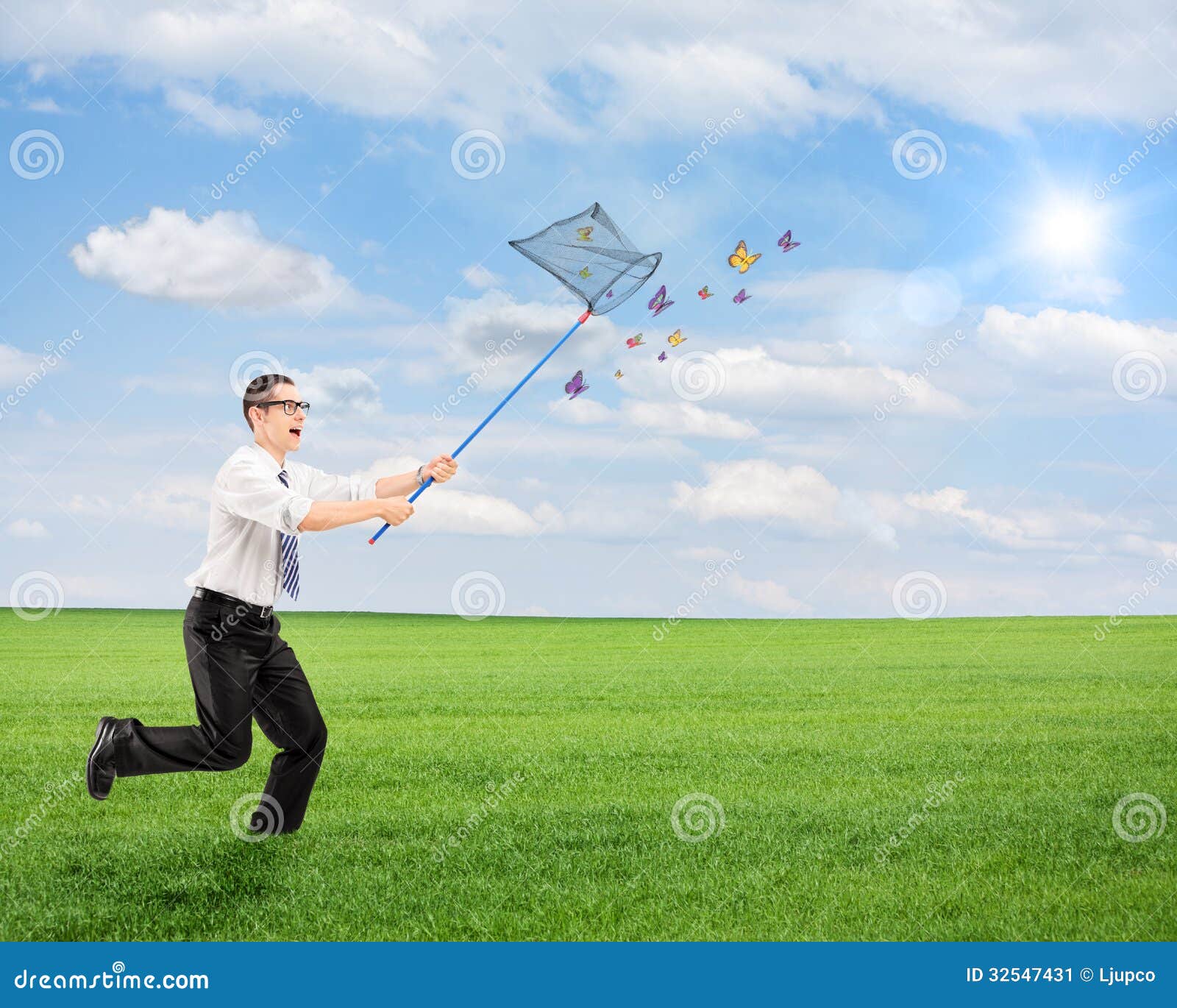 Man Running and Catching Butterflies with Net on a Field Stock Image ...