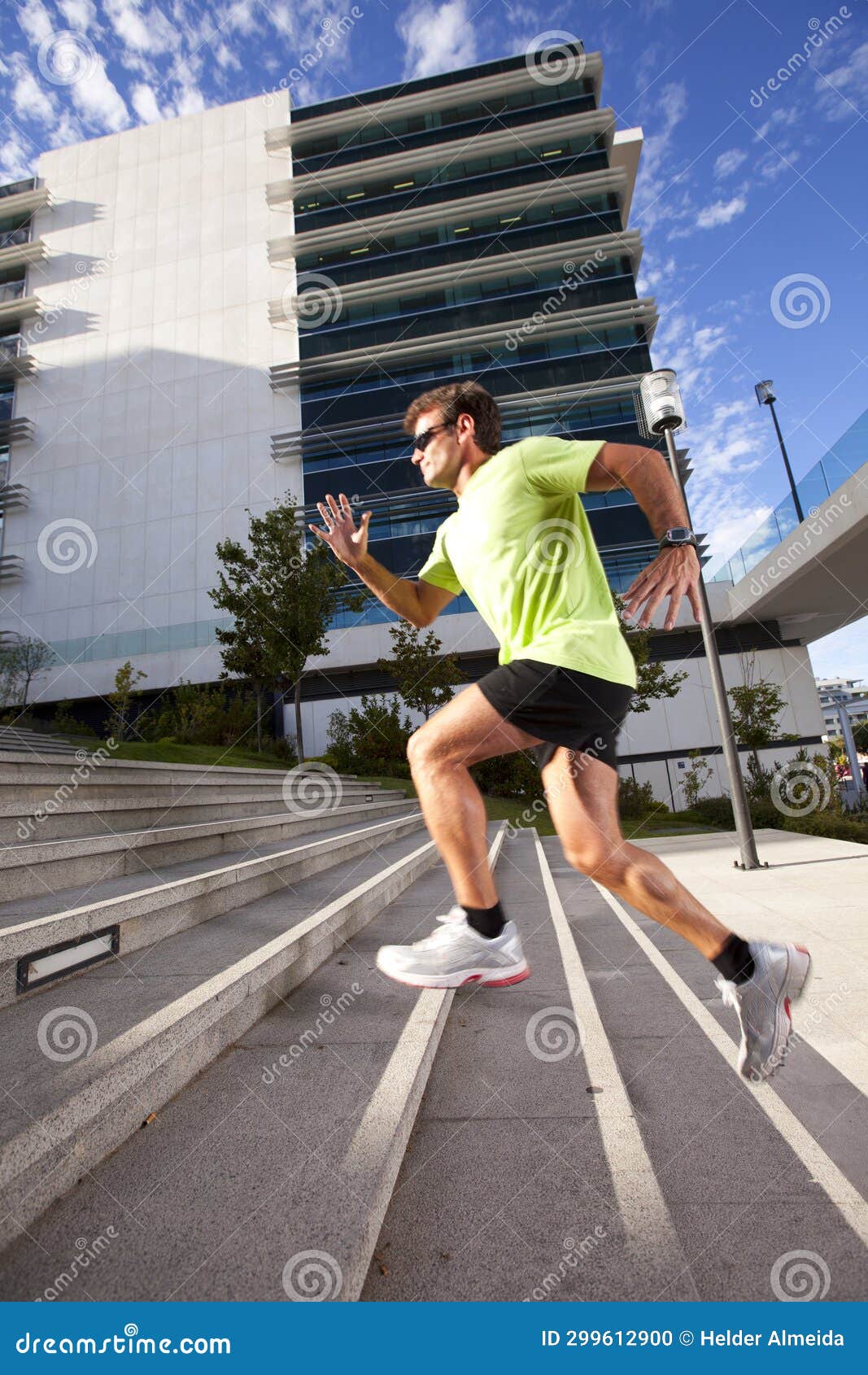 Man running at the city stock photo. Image of exercise - 299612900