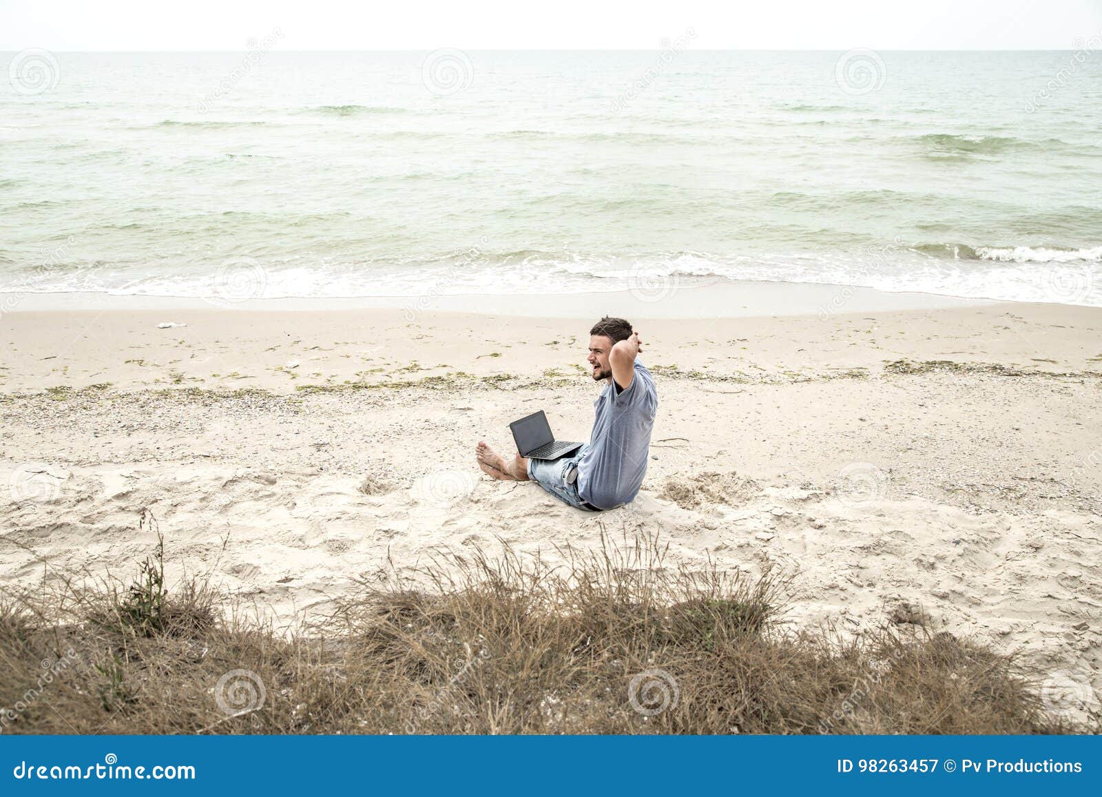 Man Running on the Computer, To Work on the Beach Stock Image - Image ...