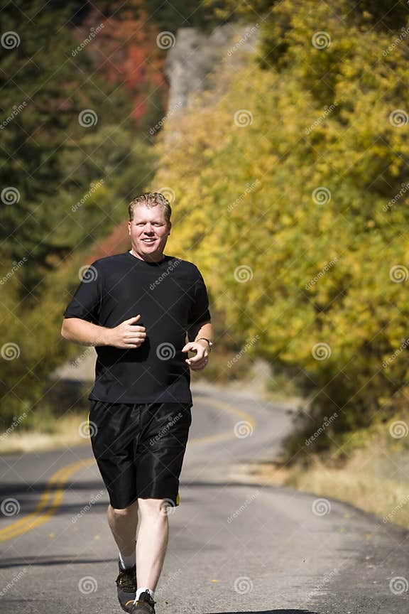 Man running fall colors stock photo. Image of colors - 11233560