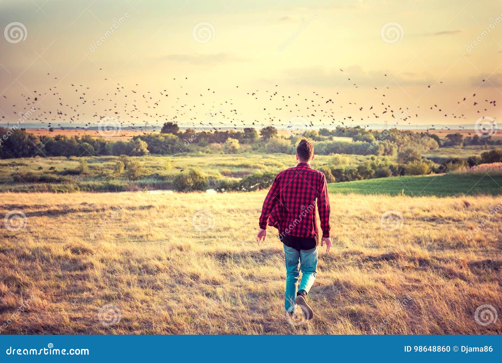 Man running on the field stock photo. Image of male, adult - 98648860
