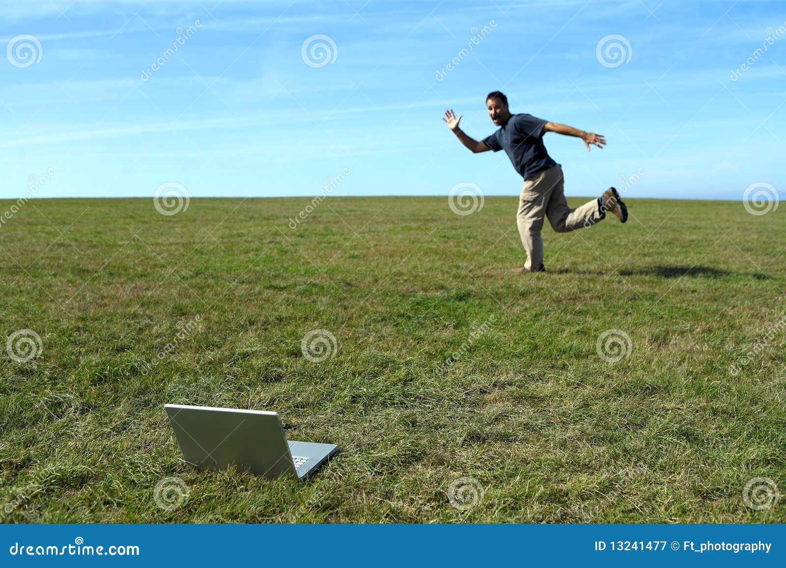 Man Running in Field Near Laptop Stock Image - Image of running, alone ...