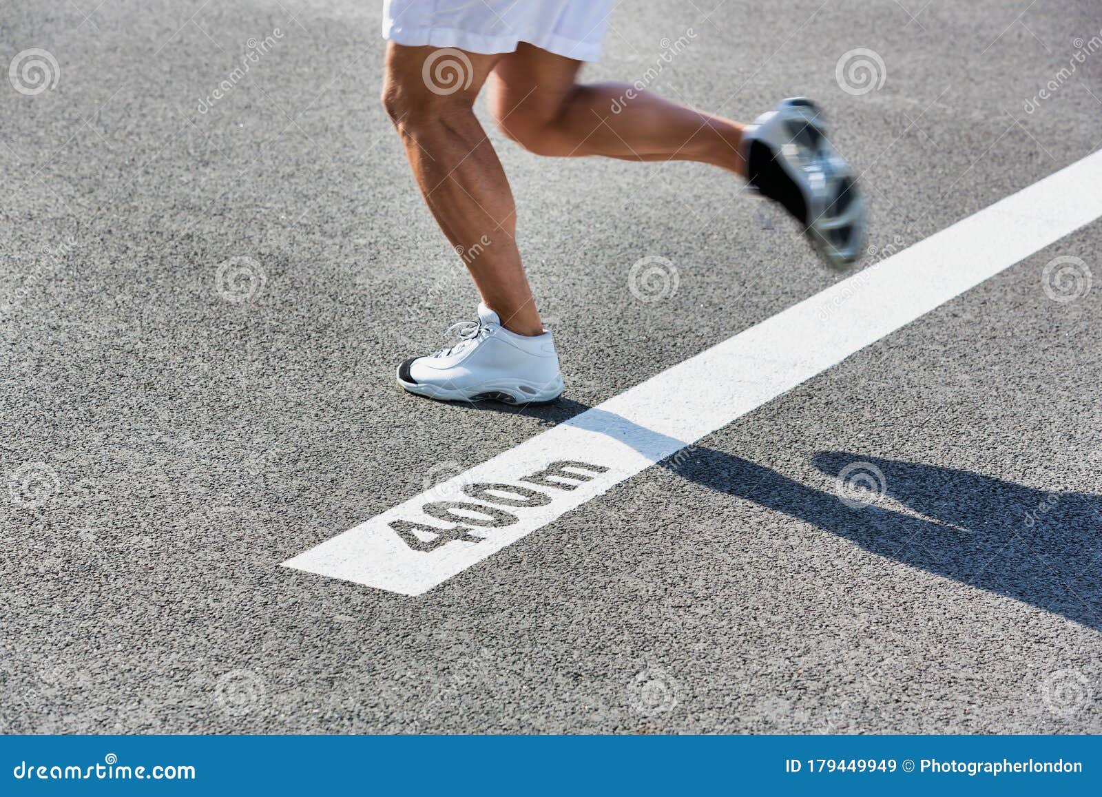 Man Running on 400 Meter Dash Stock Image - Image of adult, portrait ...
