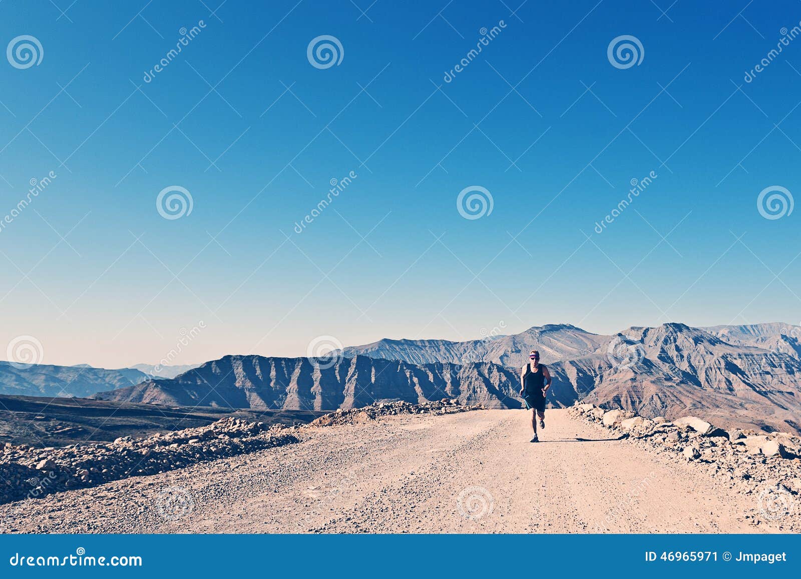 Man Running on Mountain Road Stock Image - Image of road, pass: 46965971