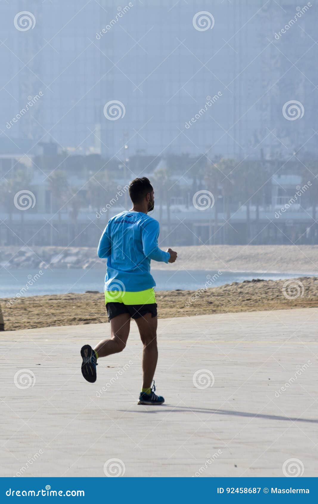 Man Running Near the Beach. Editorial Photography - Image of beach ...