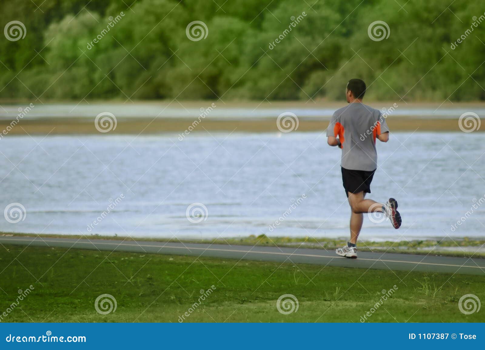 Man running in the park stock image. Image of distance - 1107387