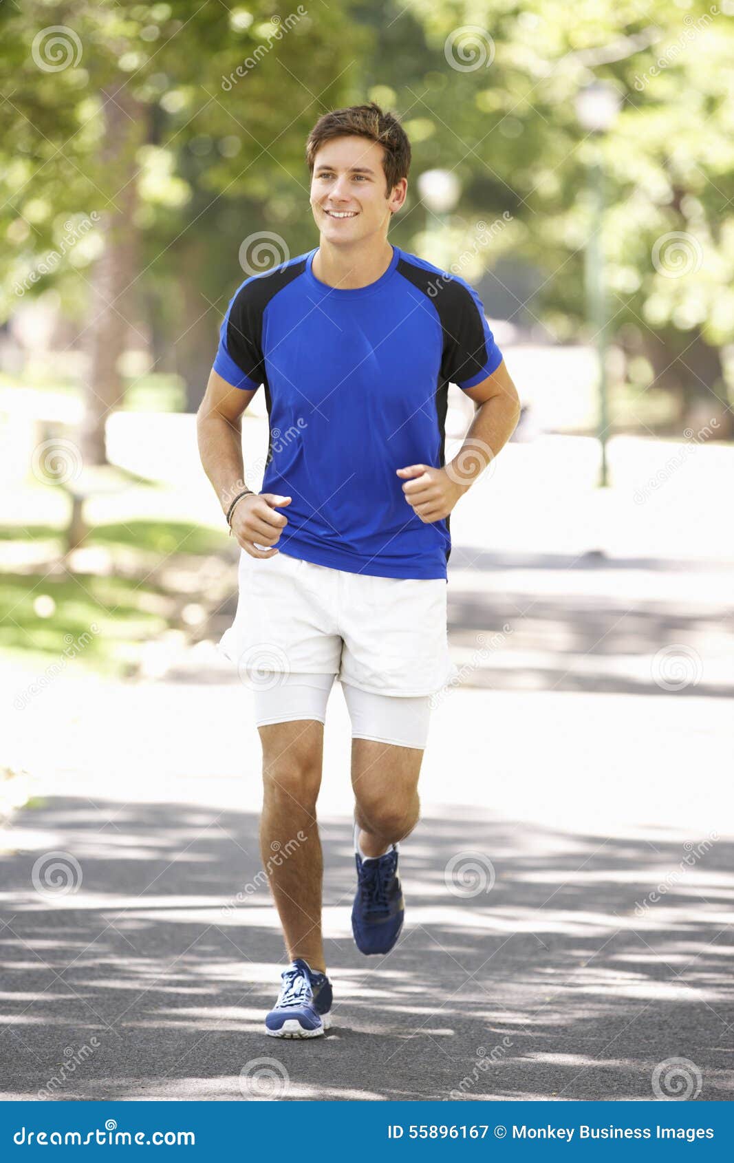 Man Running through Park stock image. Image of person - 55896167