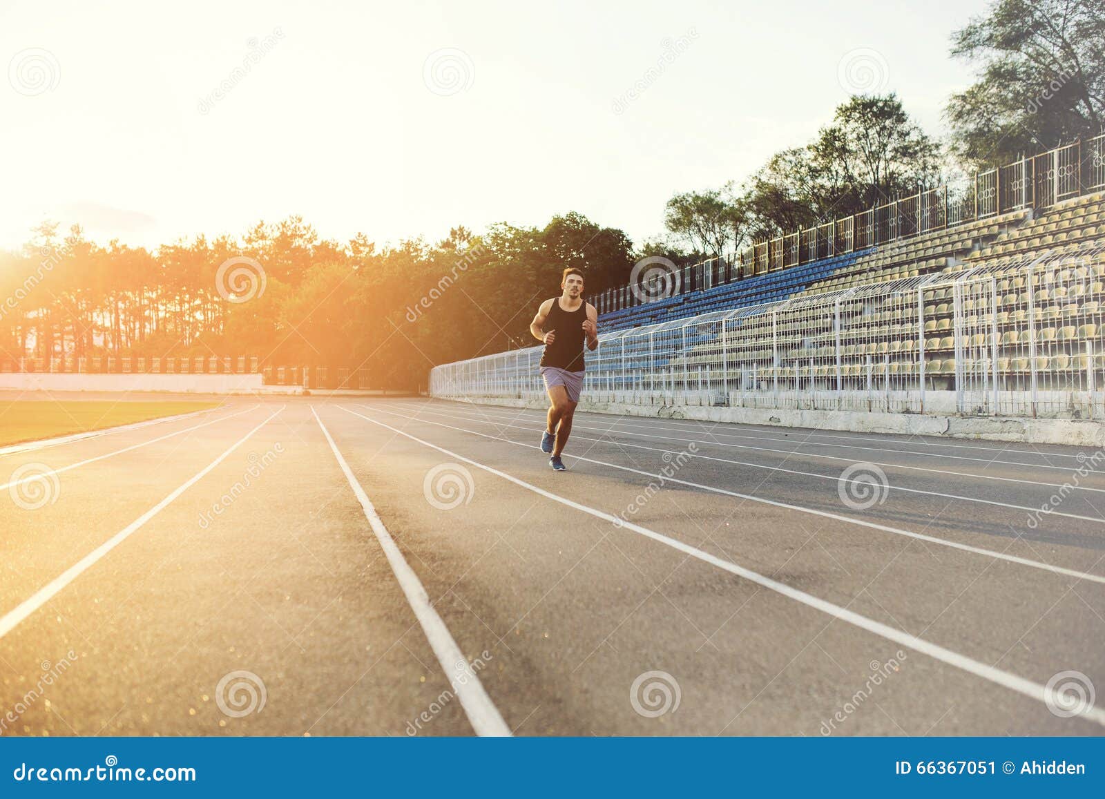 Man Running on a Racing Track Stock Image - Image of male, nature: 66367051