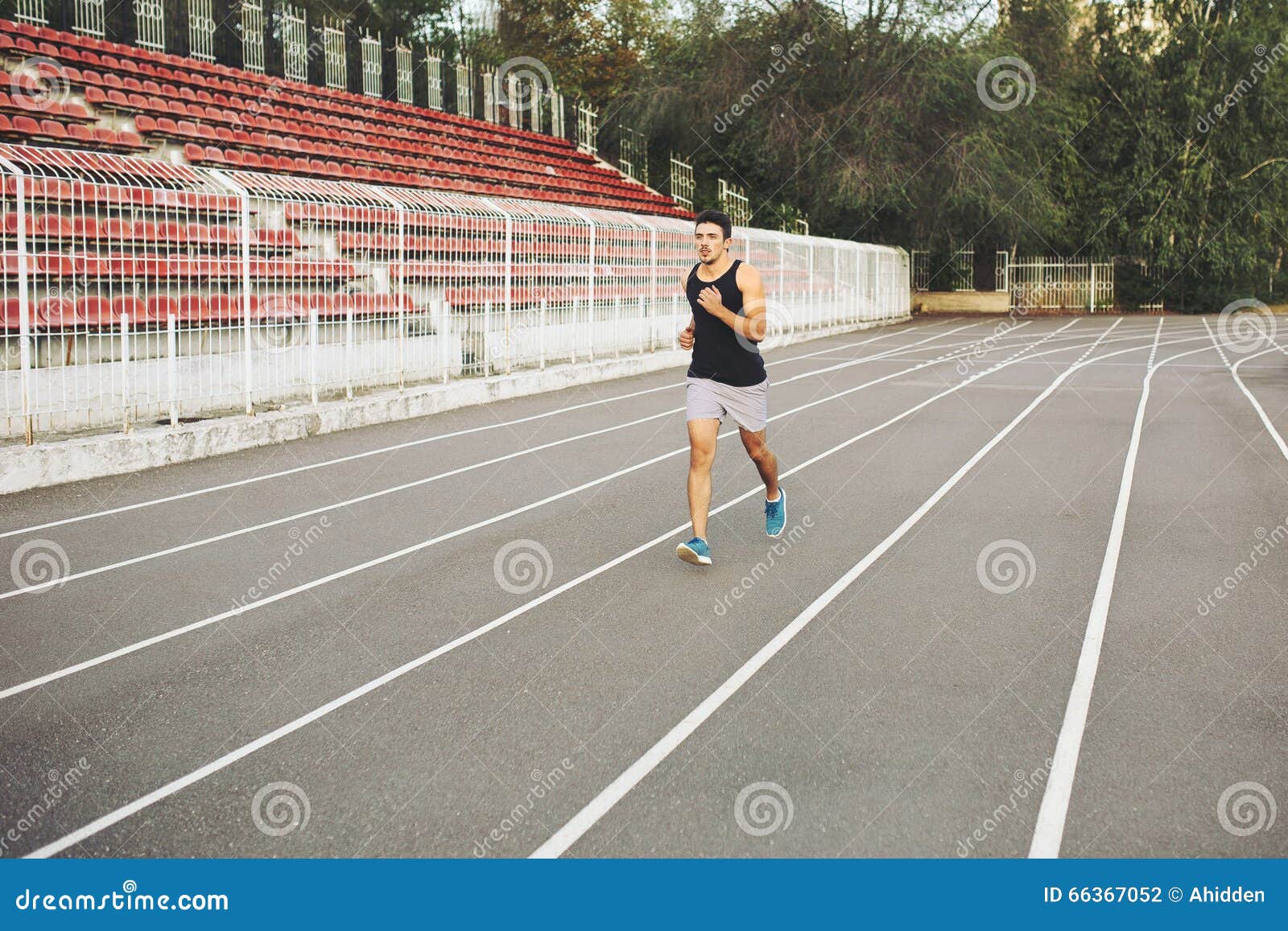 Man Running on a Racing Track Stock Photo - Image of running, line ...